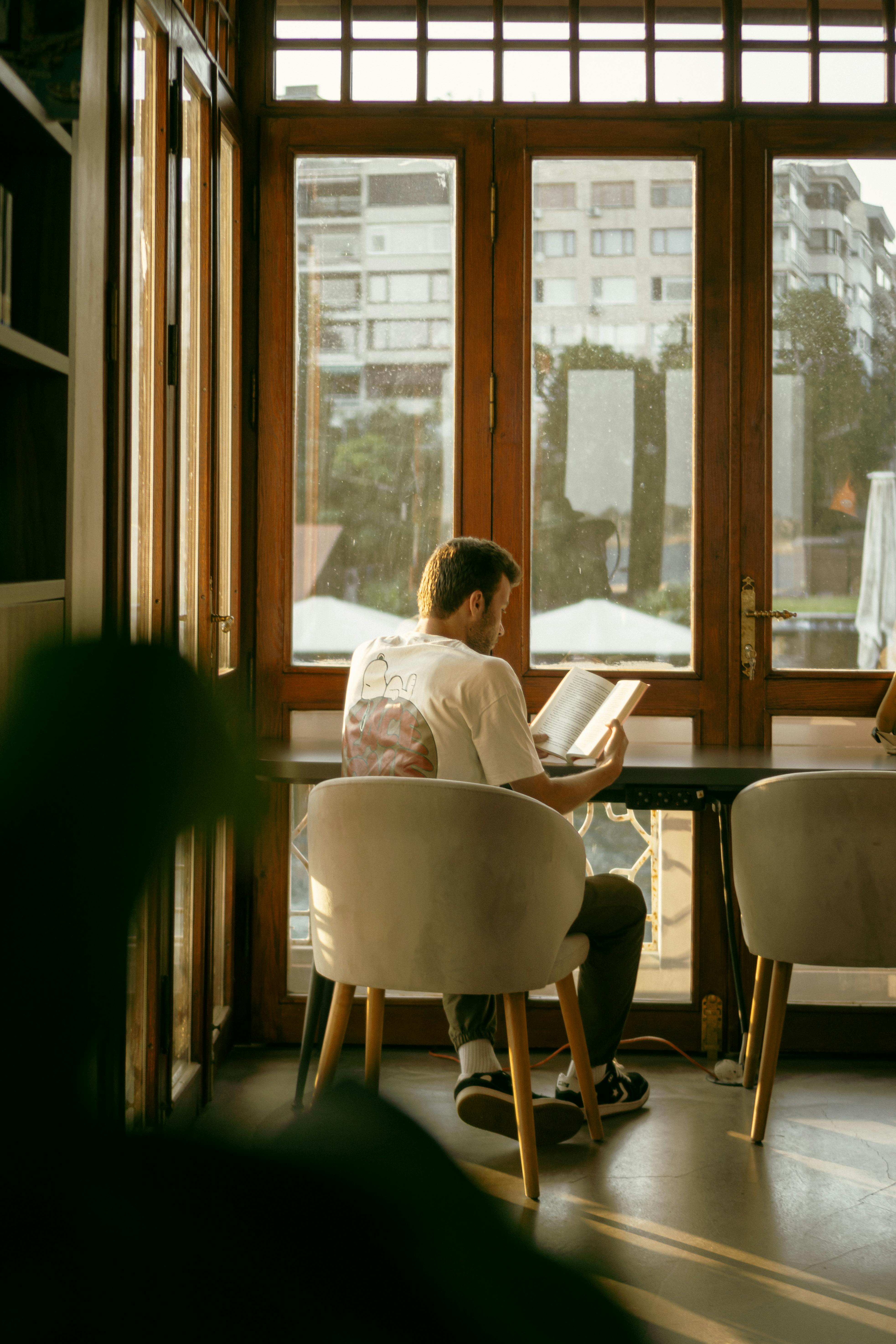 Person Reading a Book · Free Stock Photo