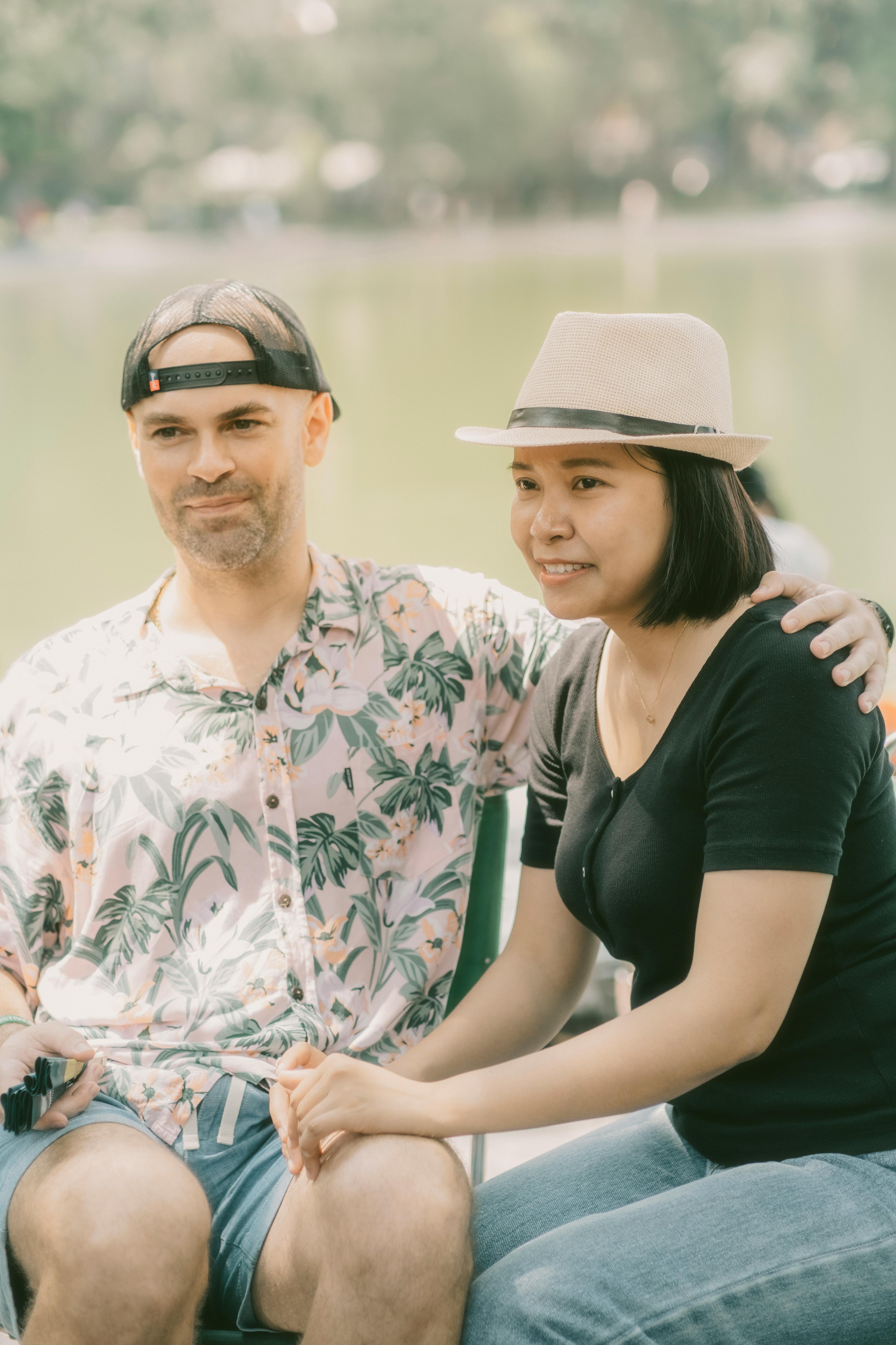 Two People Sitting Together · Free Stock Photo