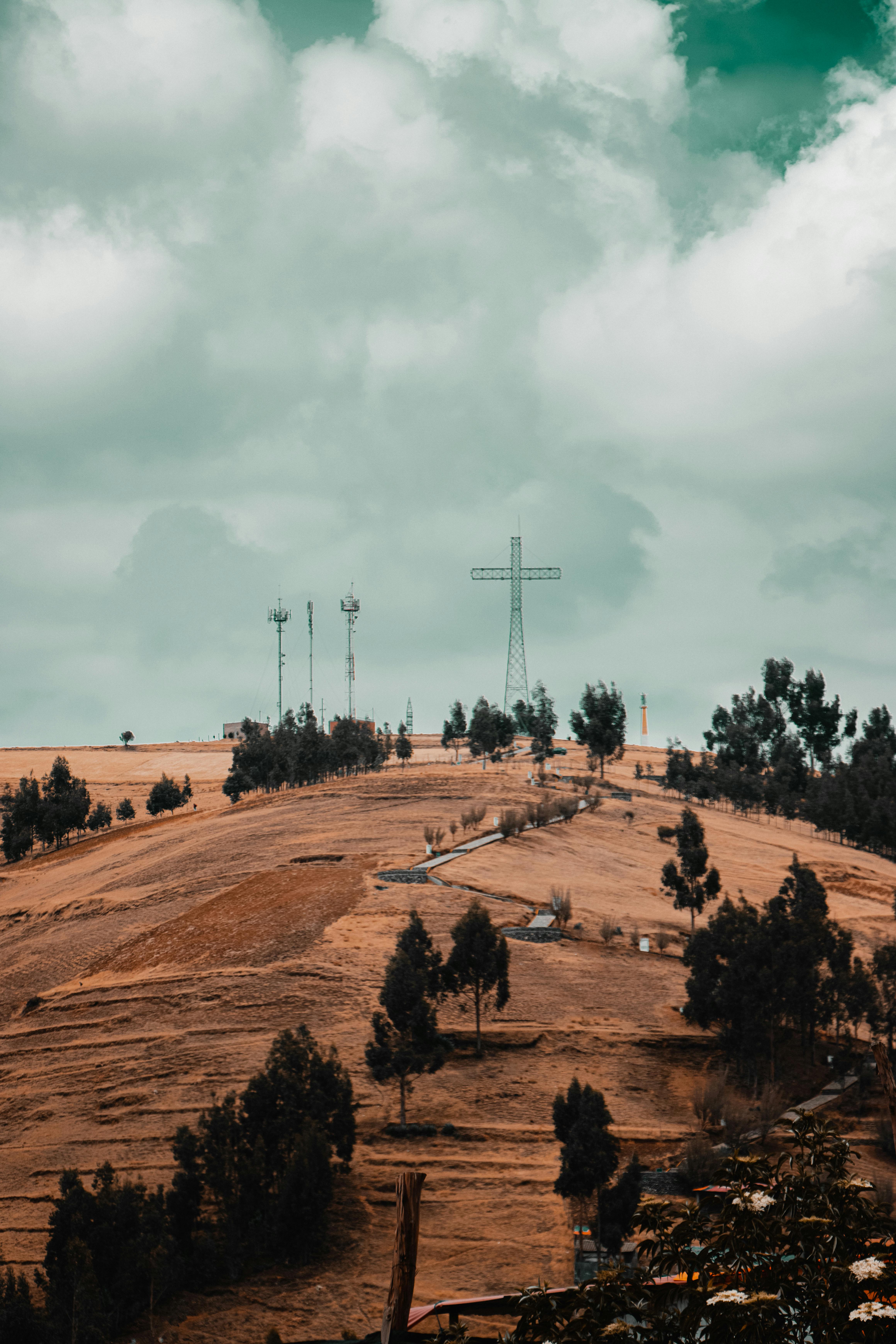 A Cross on a Hill in the Countryside · Free Stock Photo