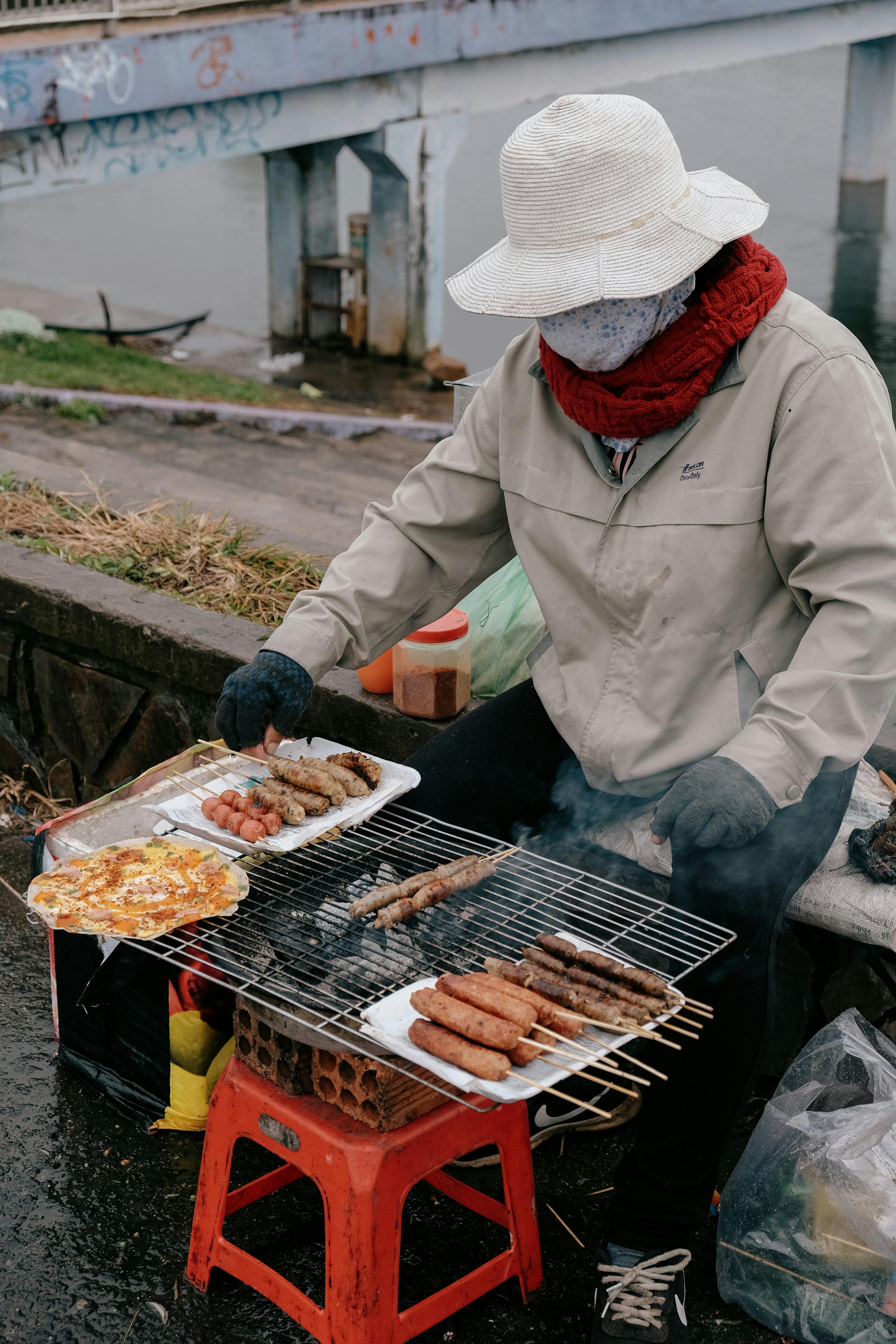 Person Preparing Food on Barbecue · Free Stock Photo