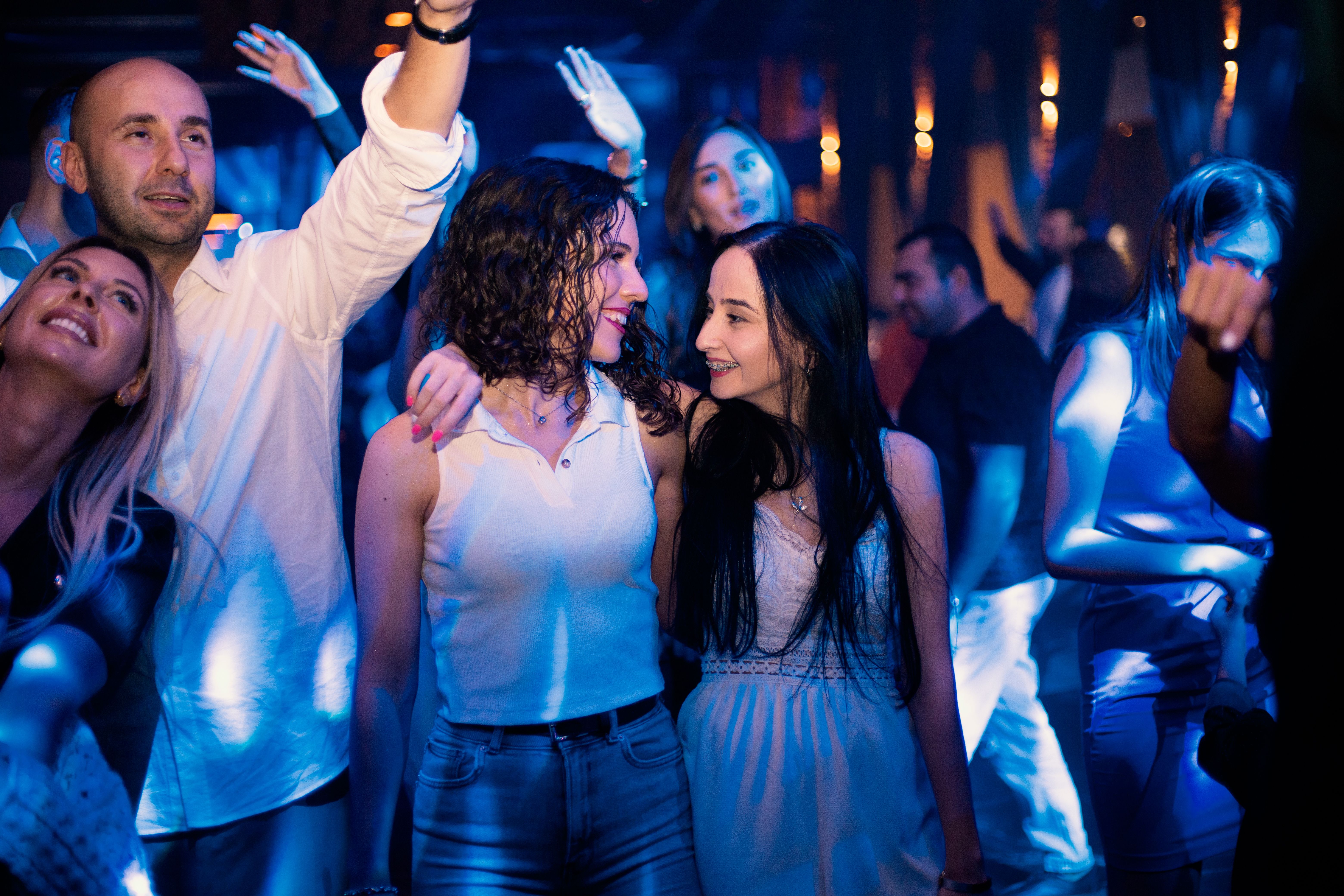 Friends Having Fun Together at the Disco · Free Stock Photo