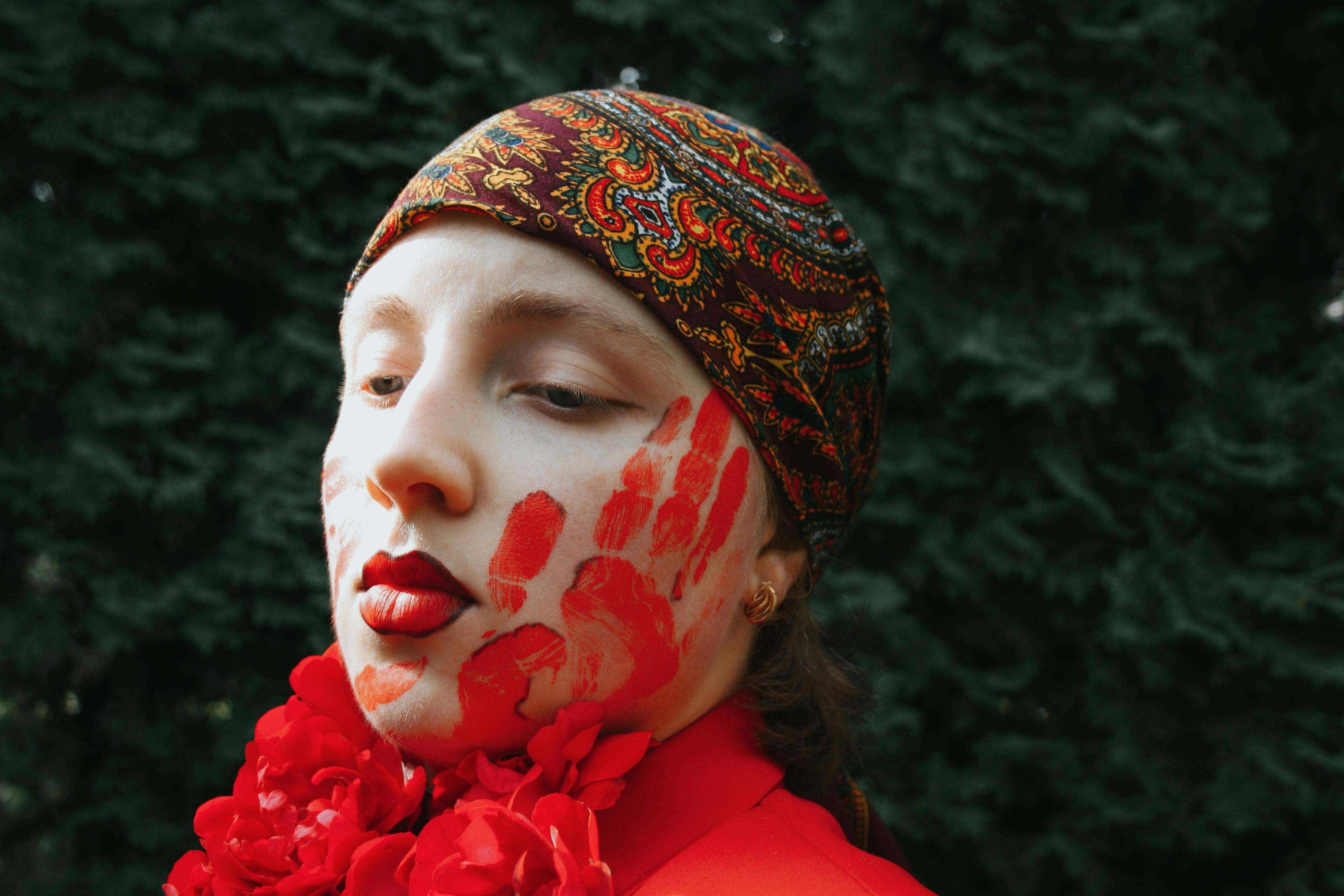 A Woman with a Red Hand Mark on her Face · Free Stock Photo