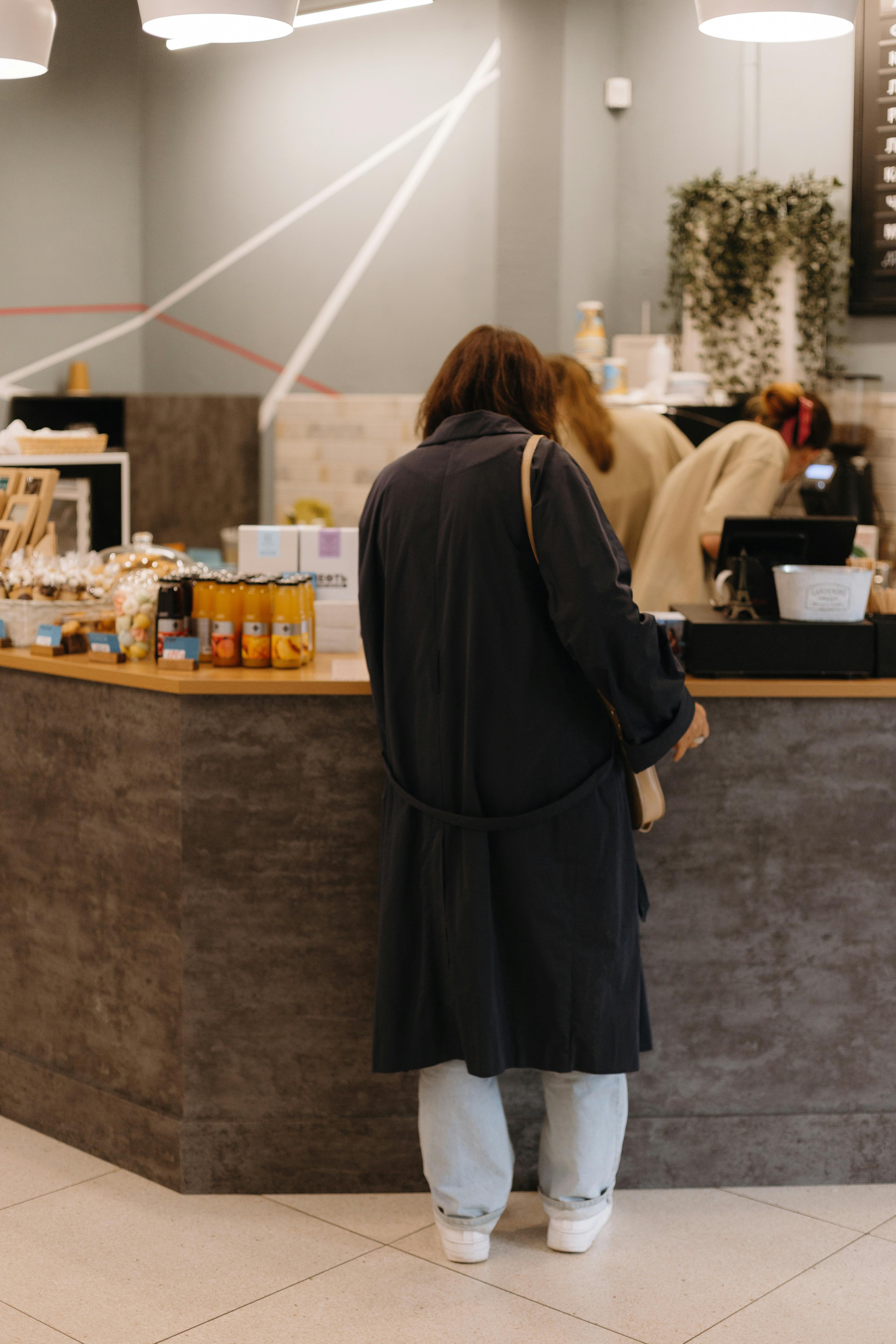 Customer at Counter in Bar · Free Stock Photo