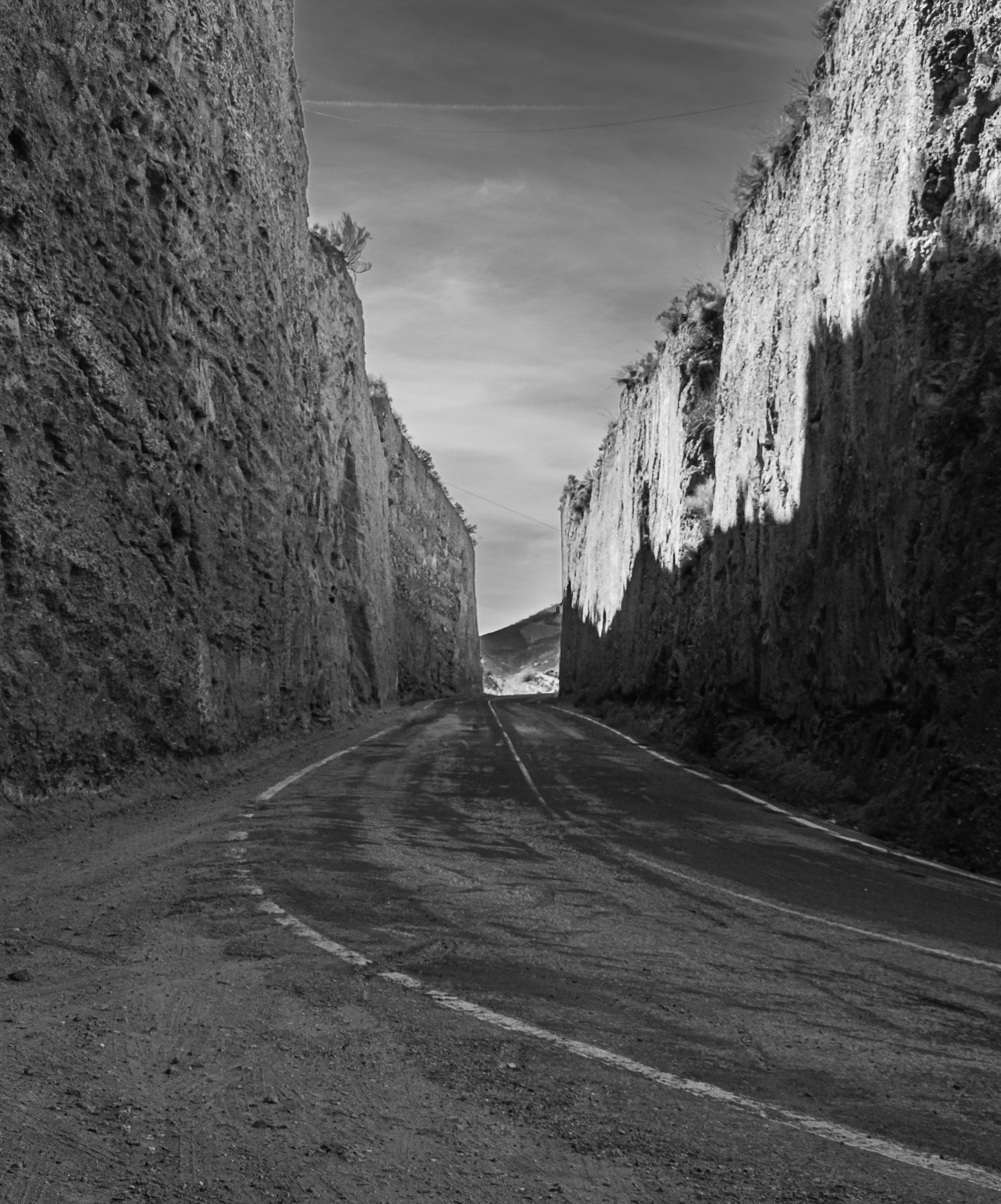 Barren Rocks Walls around Road · Free Stock Photo