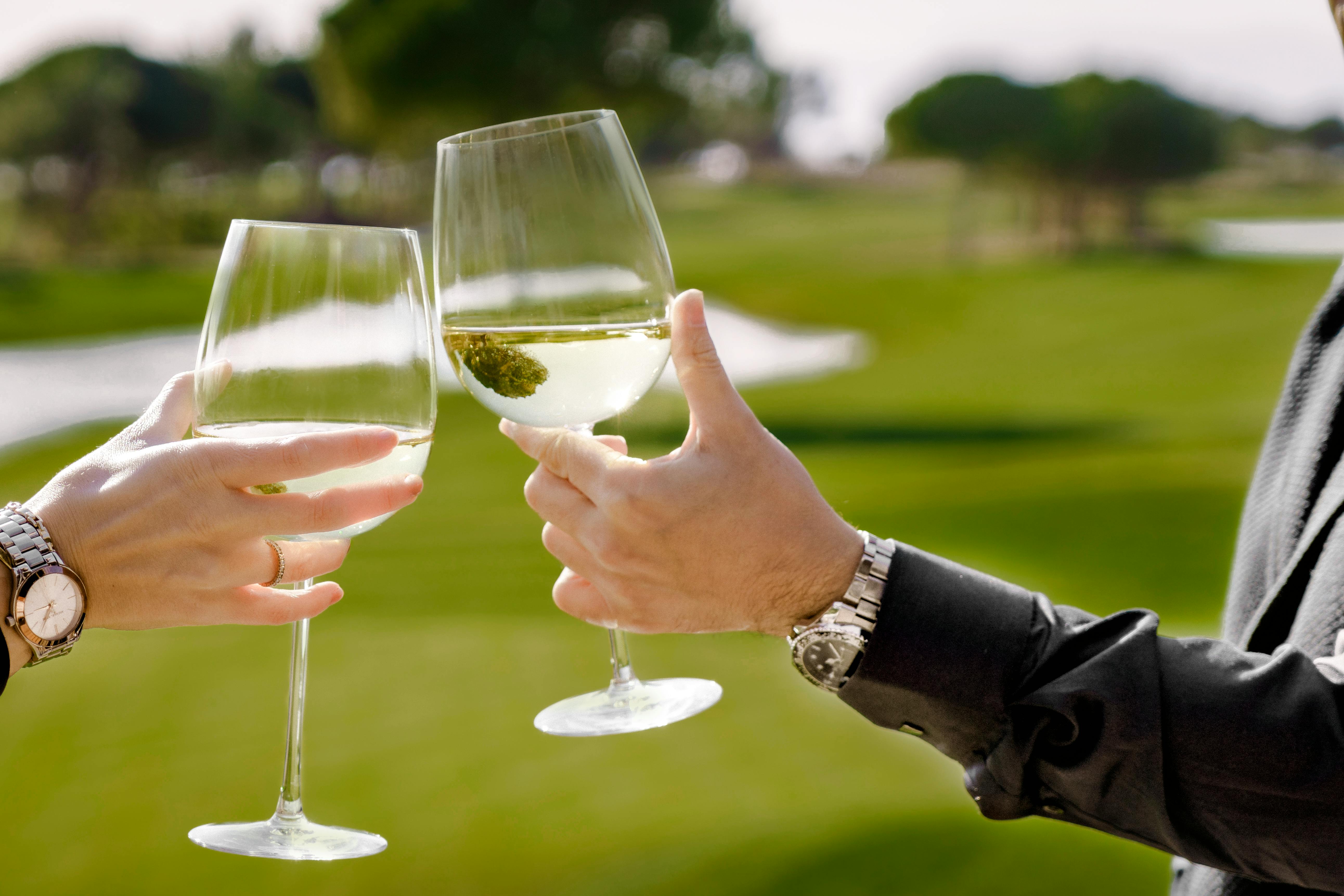 Two People with Wine · Free Stock Photo