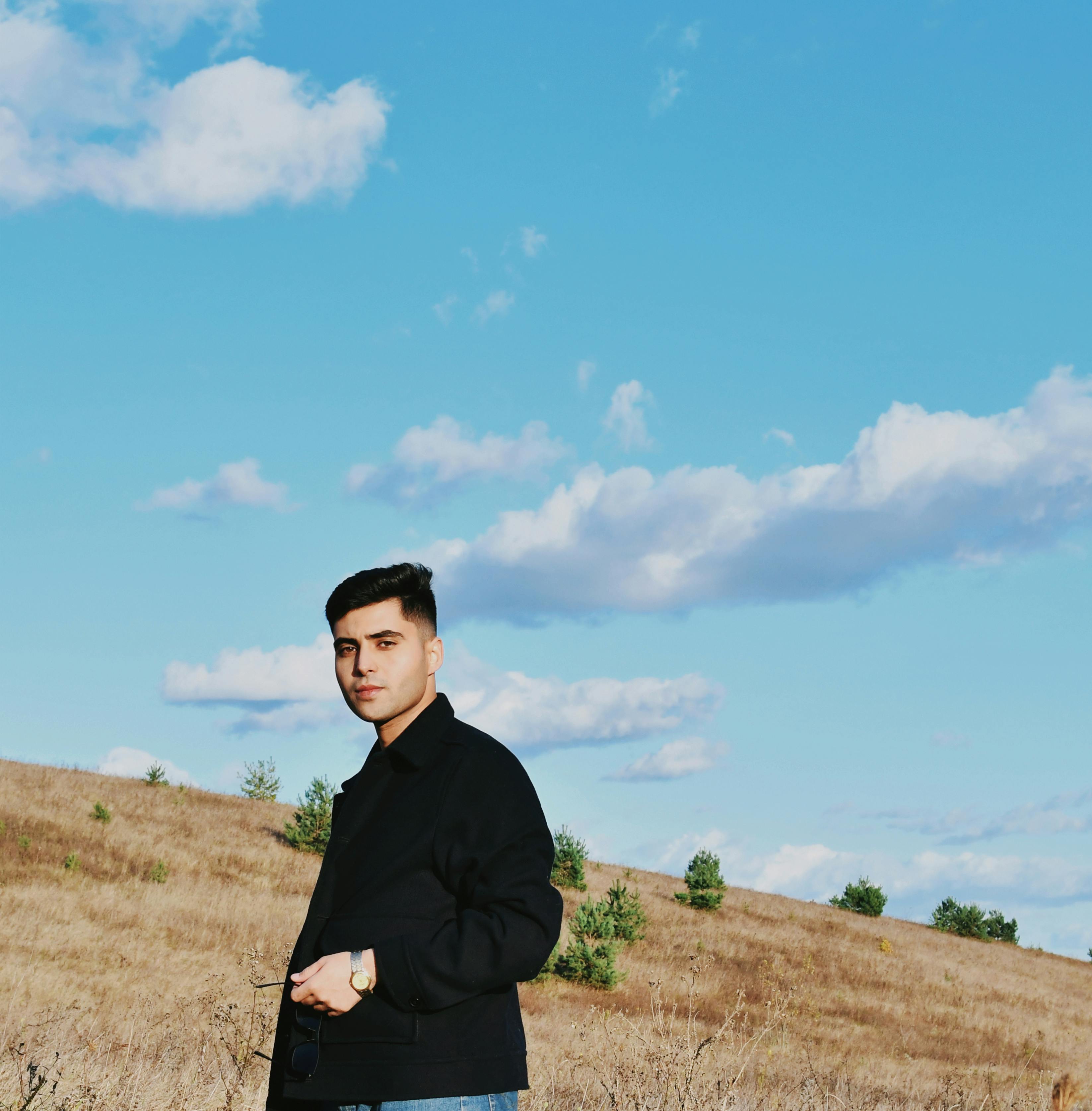 Man Standing on Bridge over Lake · Free Stock Photo