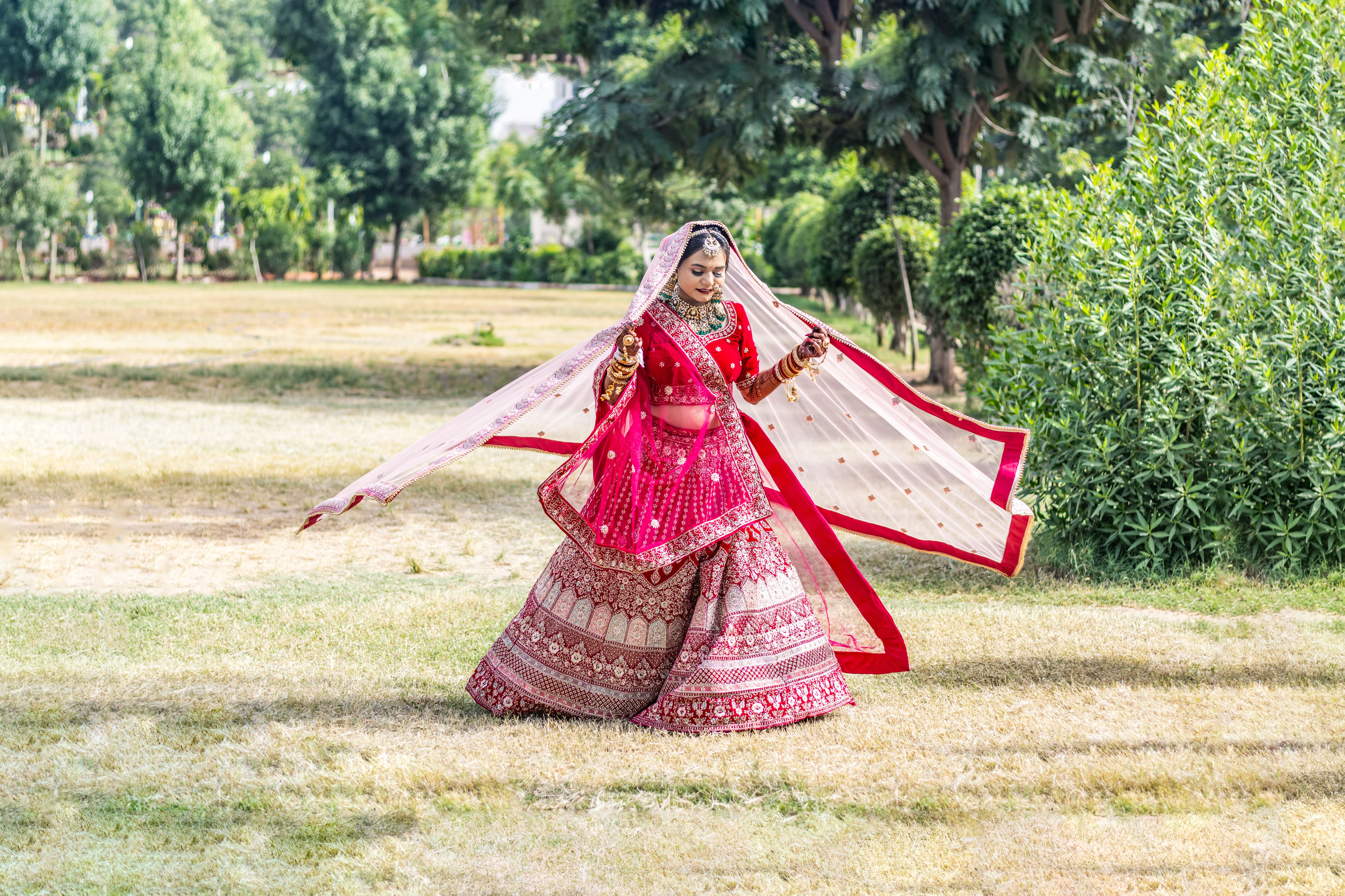 Bride in Traditional Dress in Countryside · Free Stock Photo