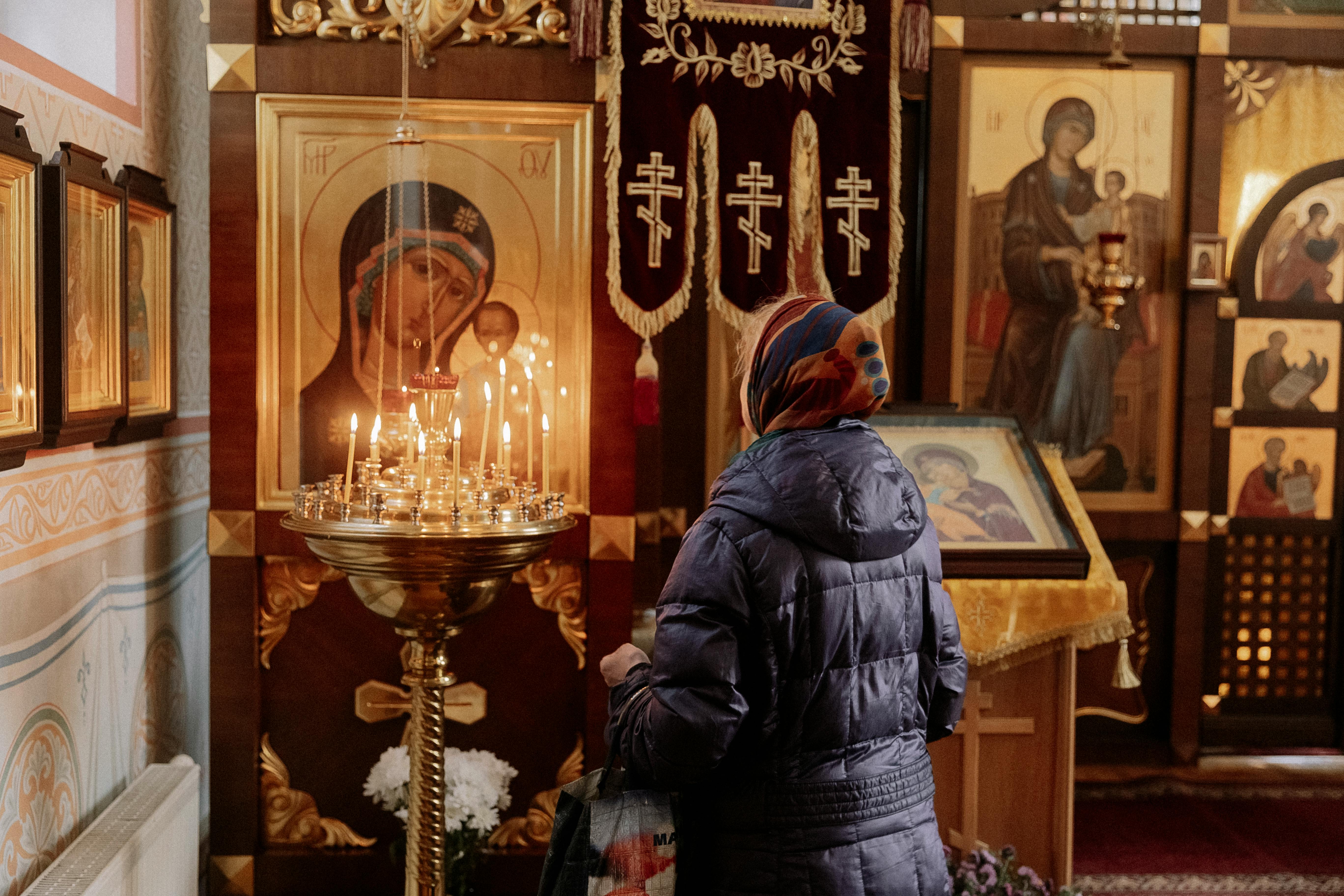 Woman PRaying in Orthodox Church · Free Stock Photo