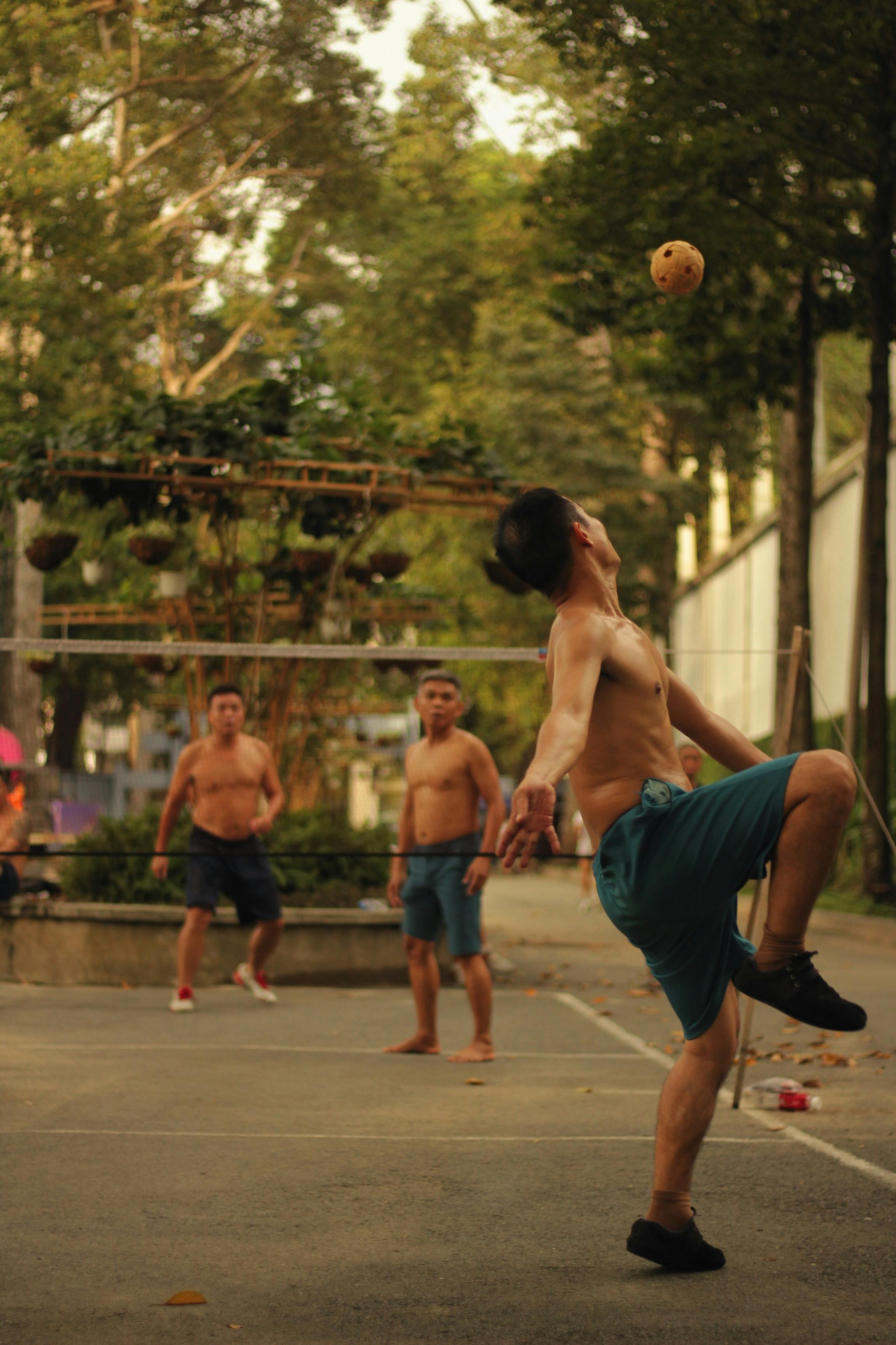 Men Playing with Ball · Free Stock Photo