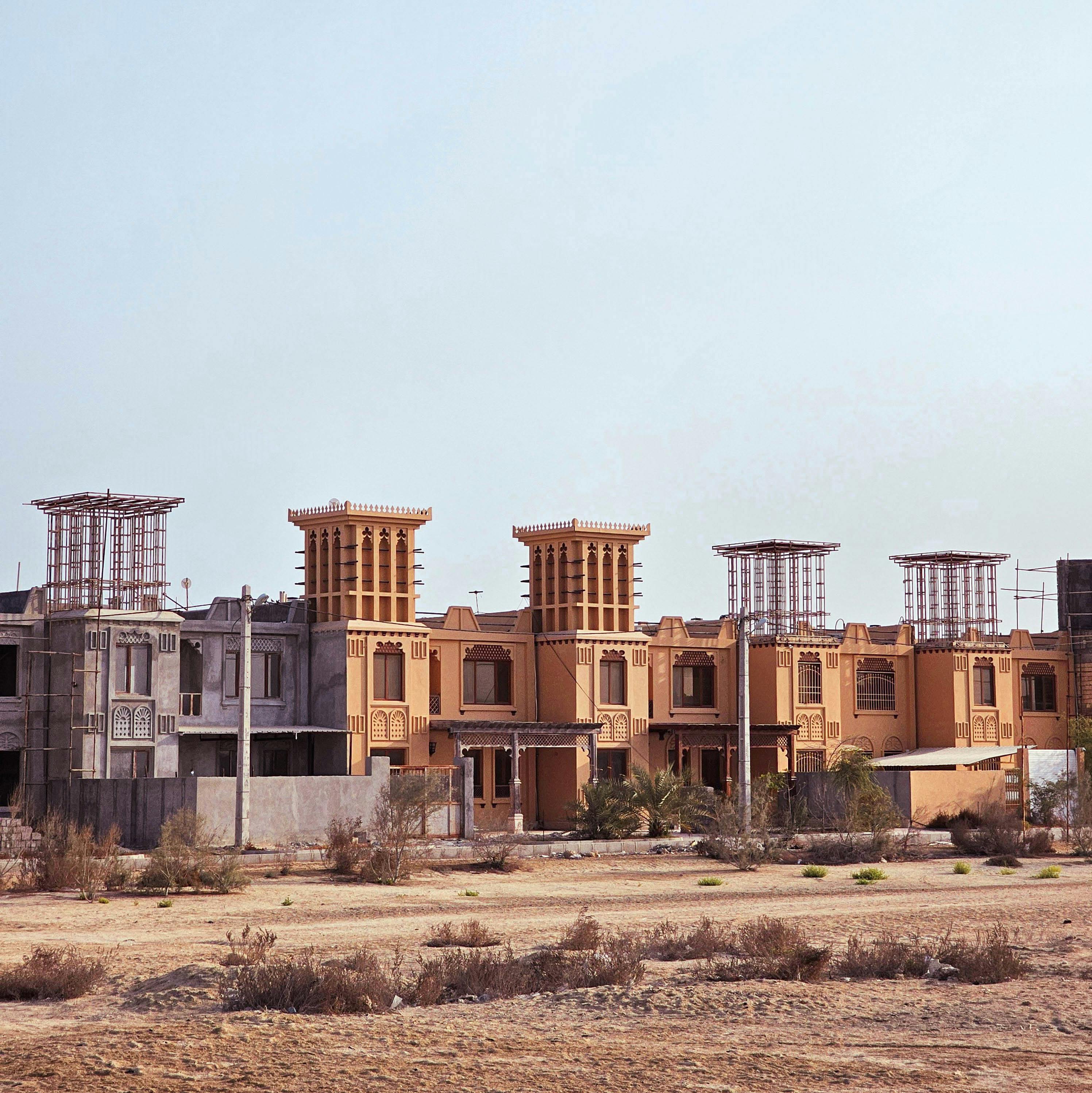 Houses with Wind Breakers under Construction · Free Stock Photo