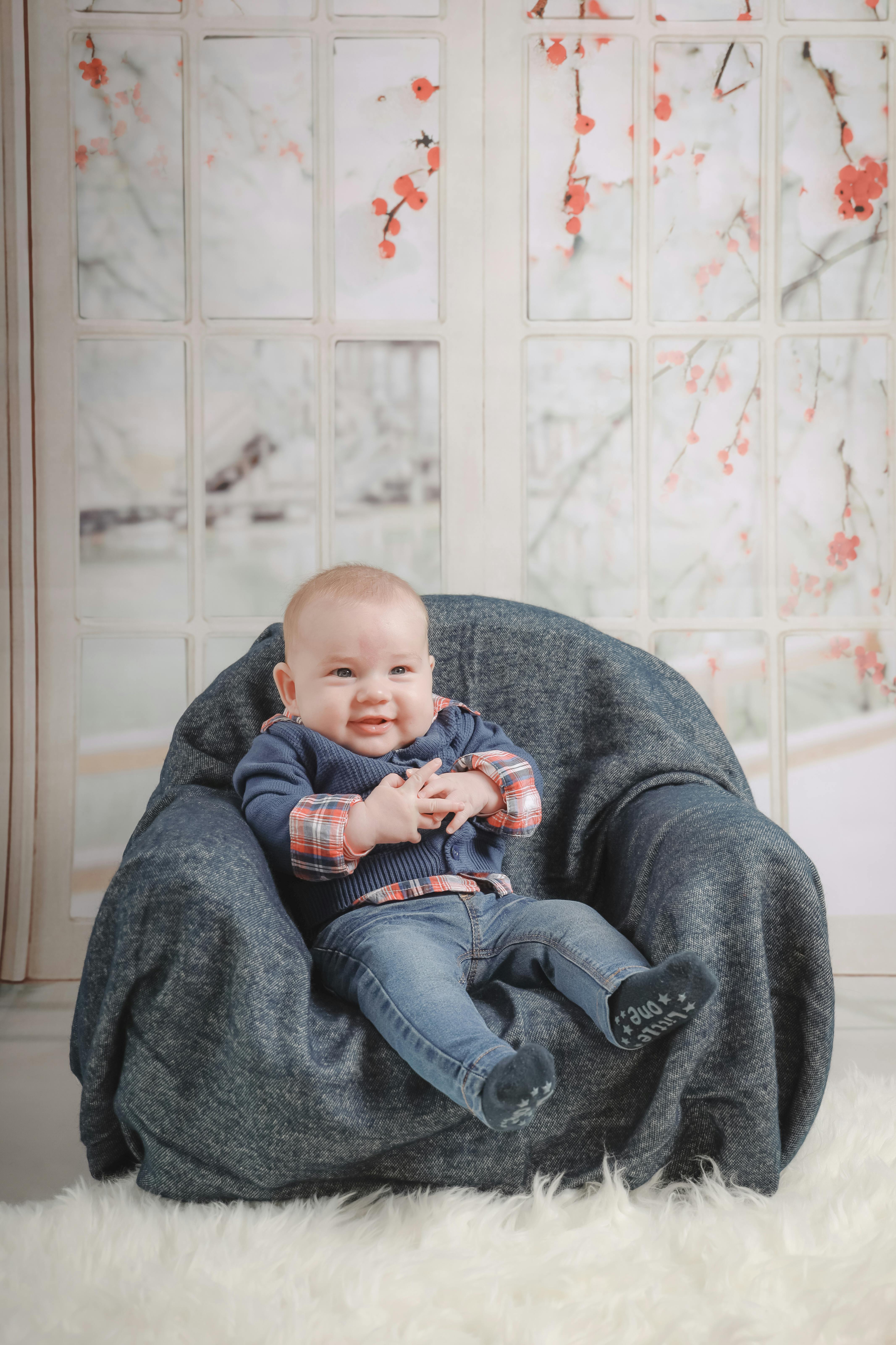 Baby Sitting on Sofa Chair · Free Stock Photo
