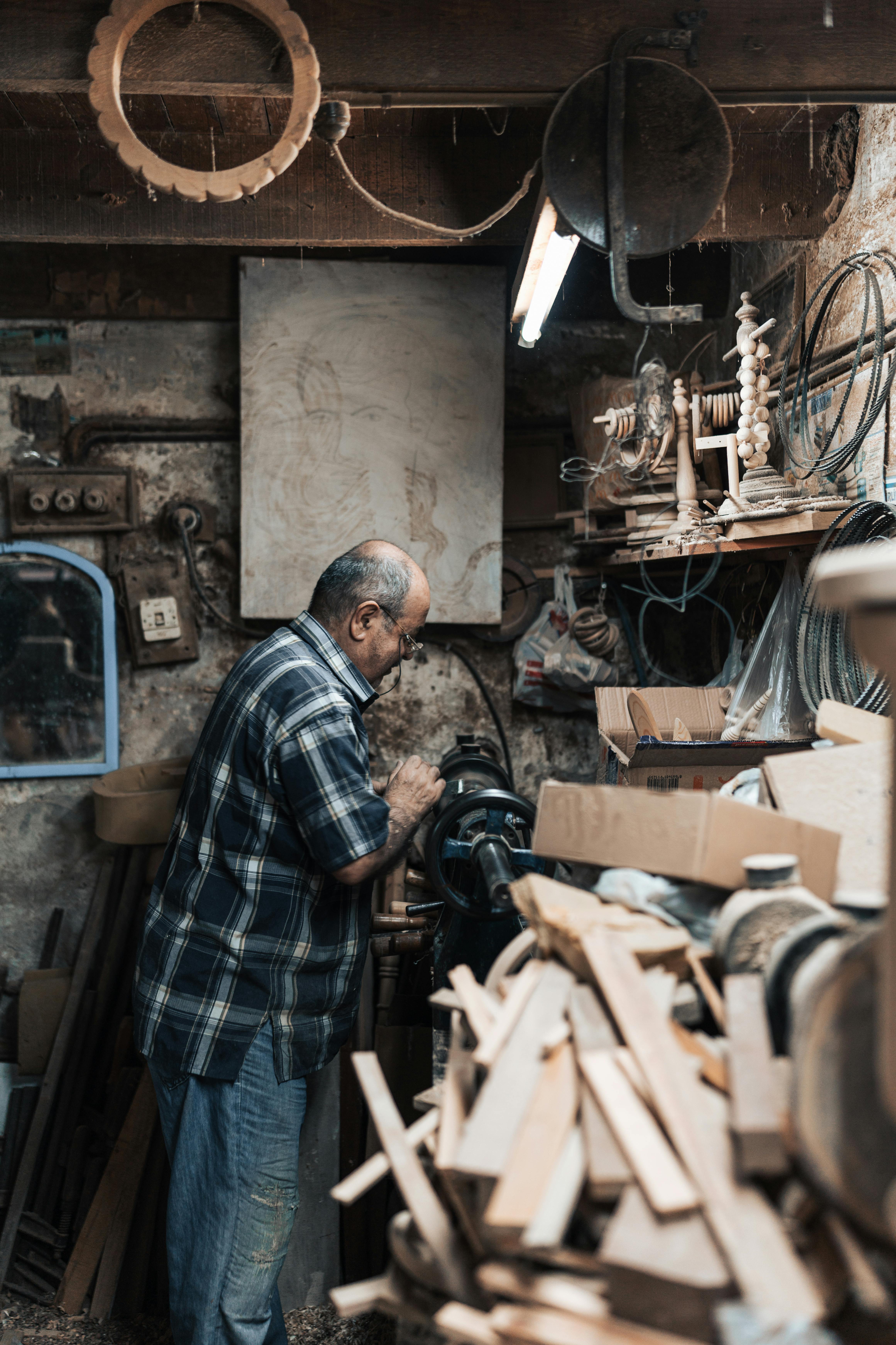 Man Working in Workshop · Free Stock Photo