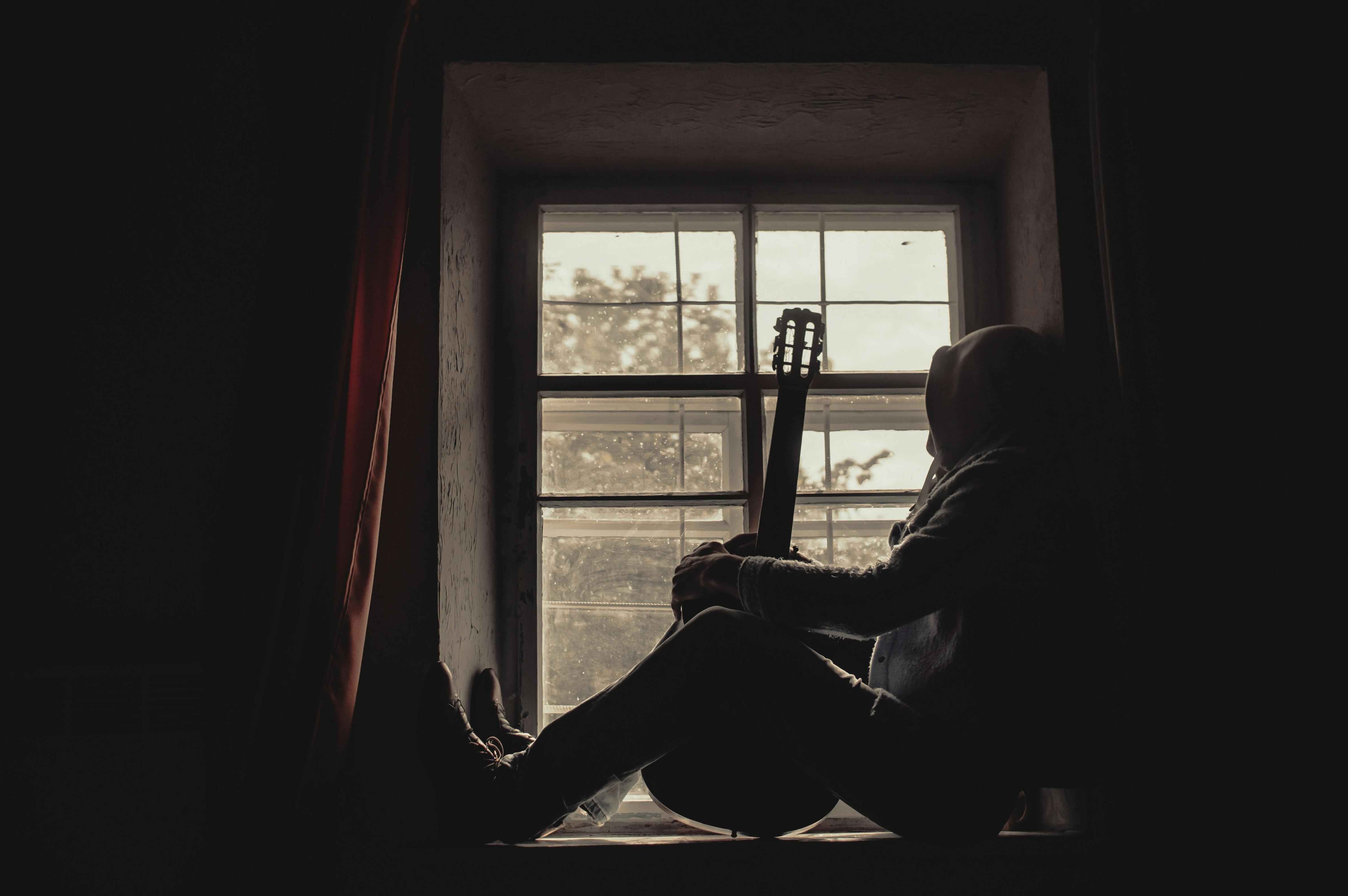 Guitar Beside Window · Free Stock Photo
