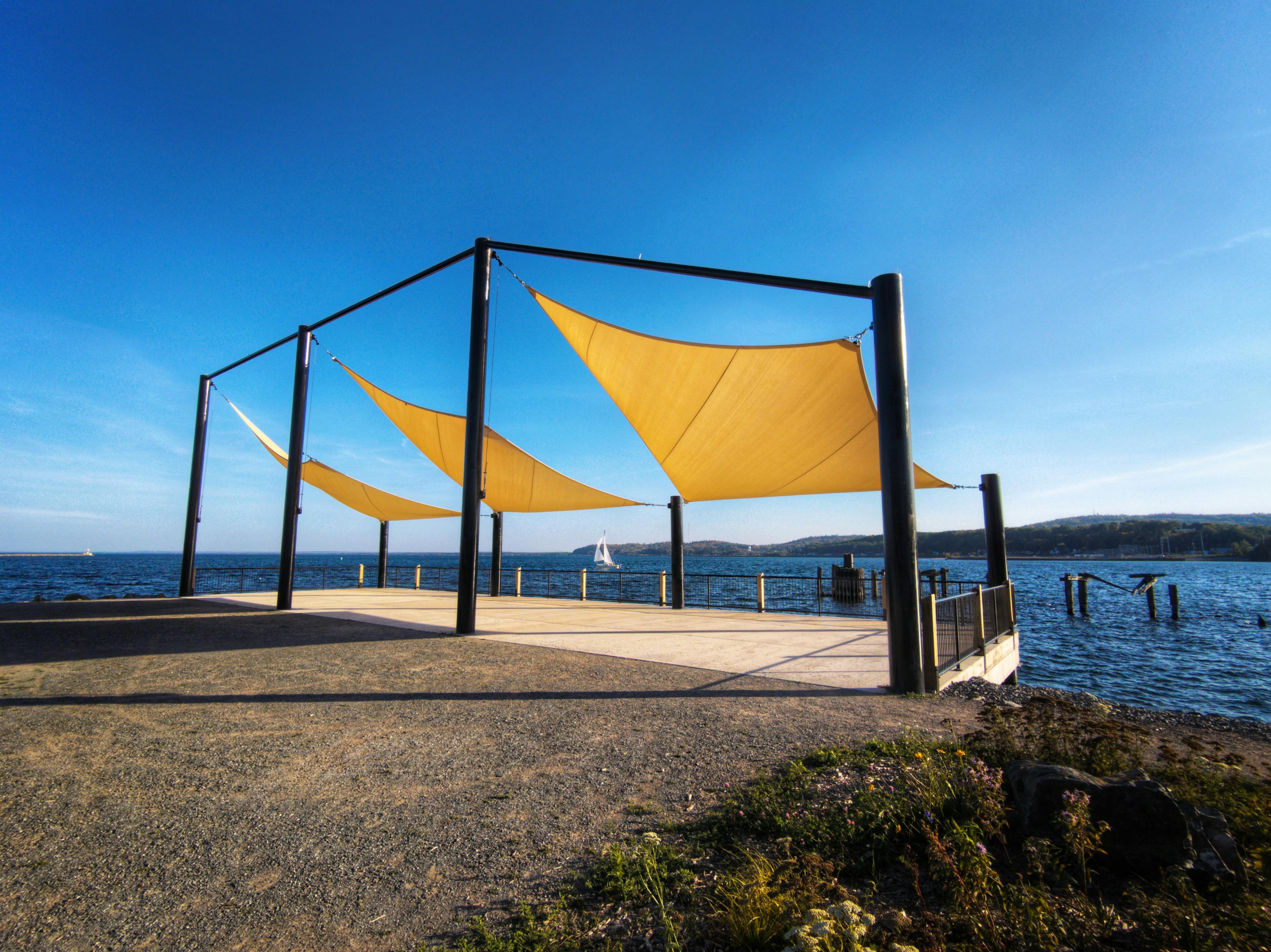 Terrace with Covers on Sea Shore · Free Stock Photo