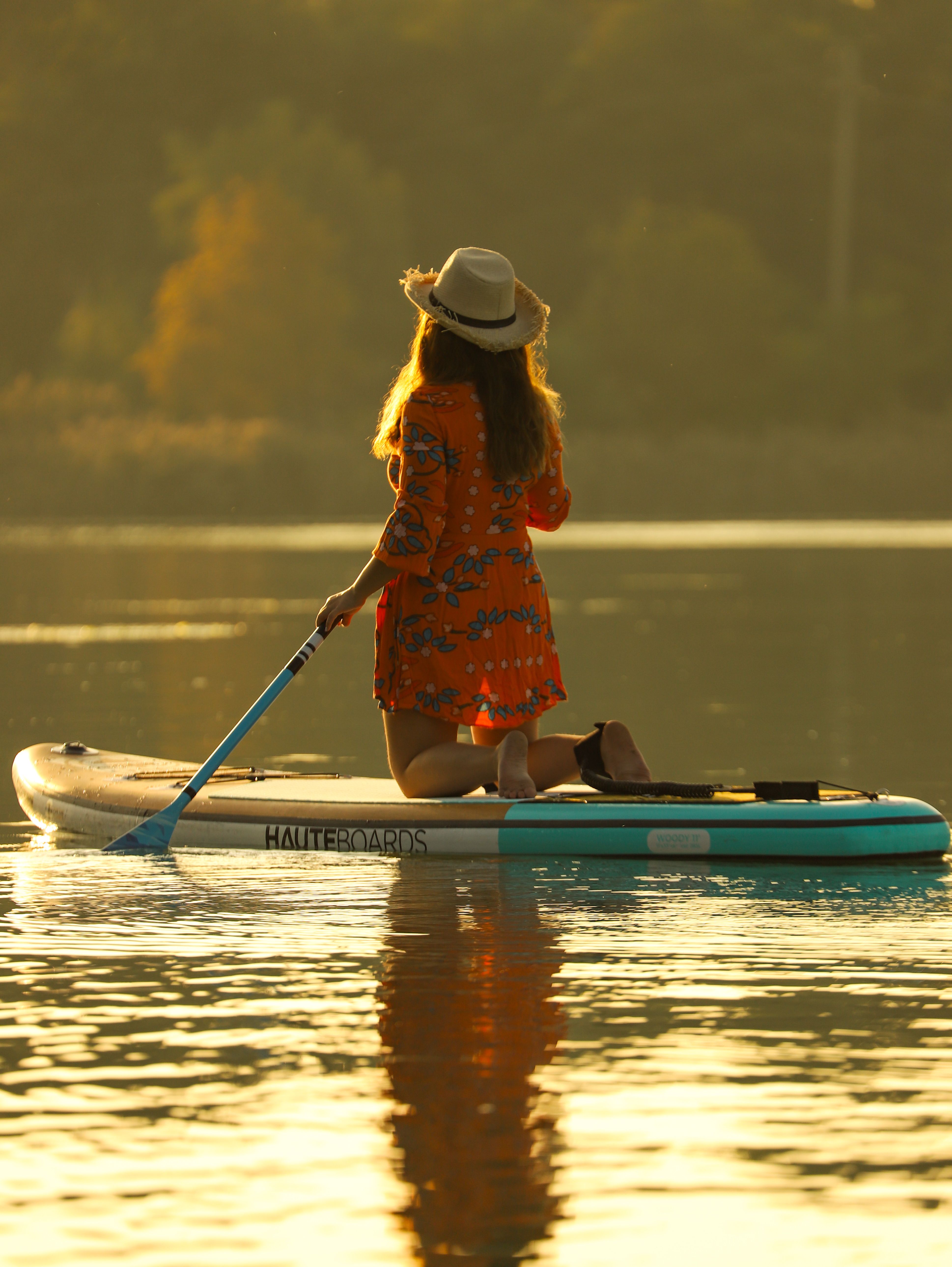 A Woman on a Paddleboard · Free Stock Photo