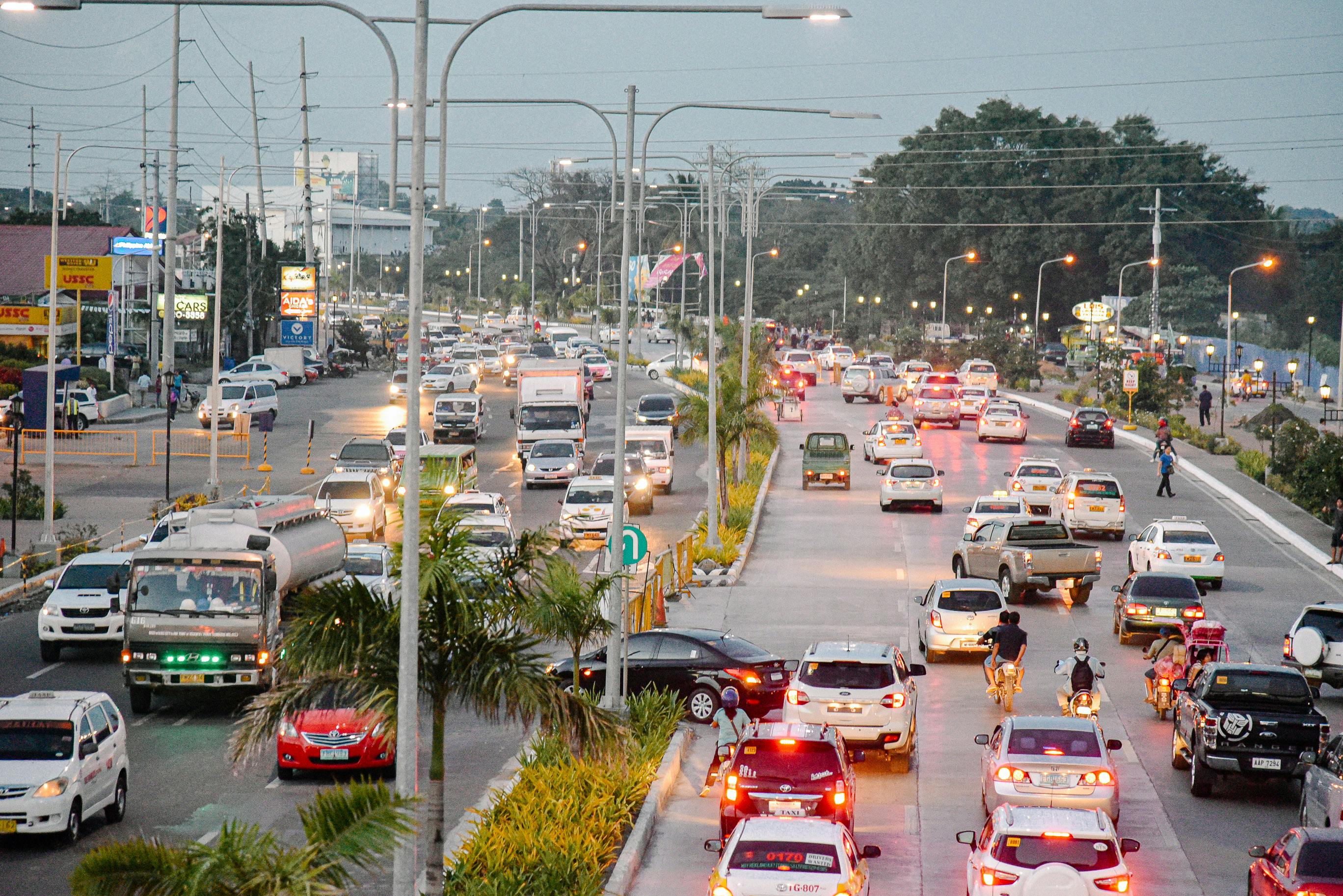 Traffic on Road in Town · Free Stock Photo