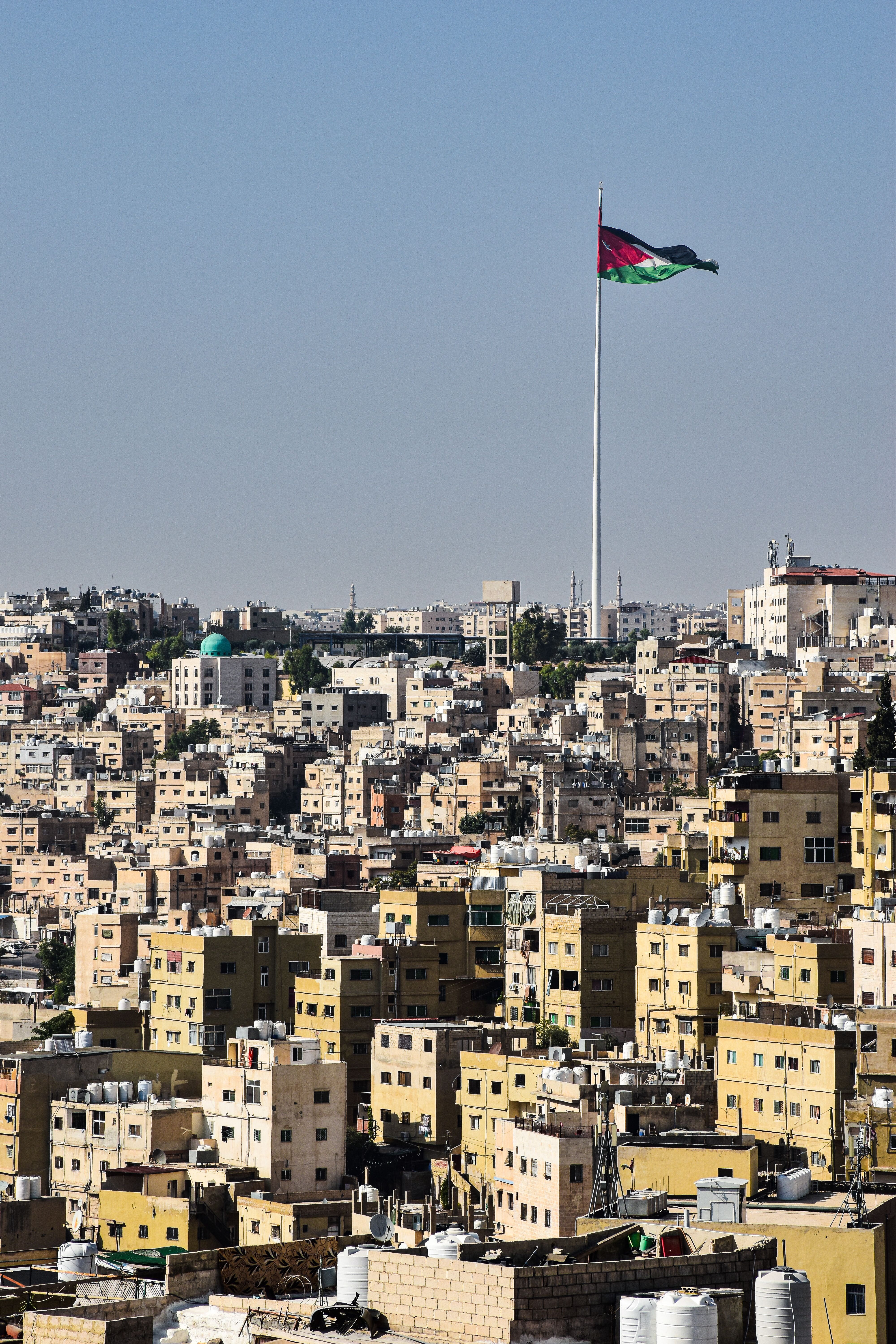 Flag over Amman Buildings · Free Stock Photo