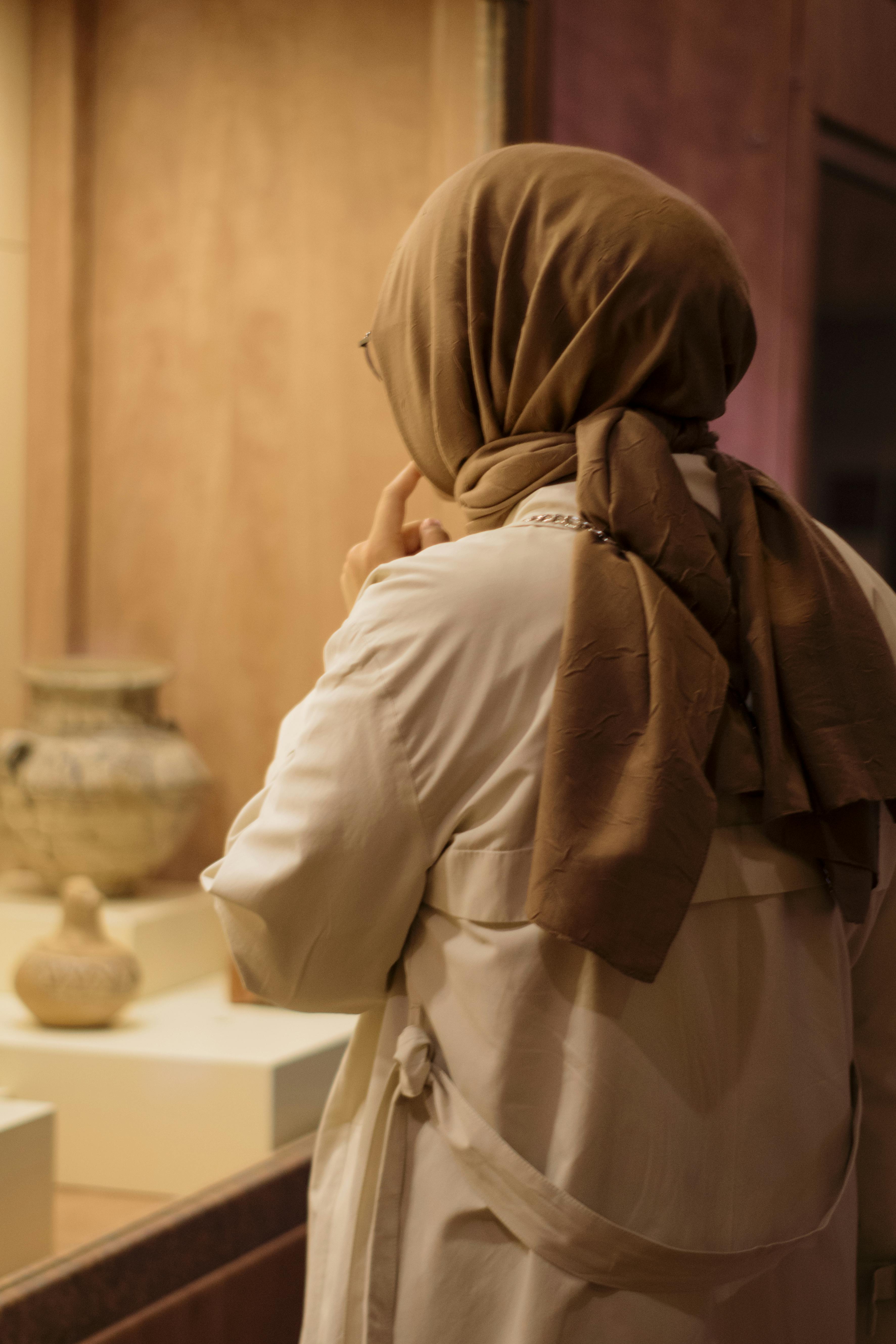 Back View of Woman in Hijab in Museum · Free Stock Photo