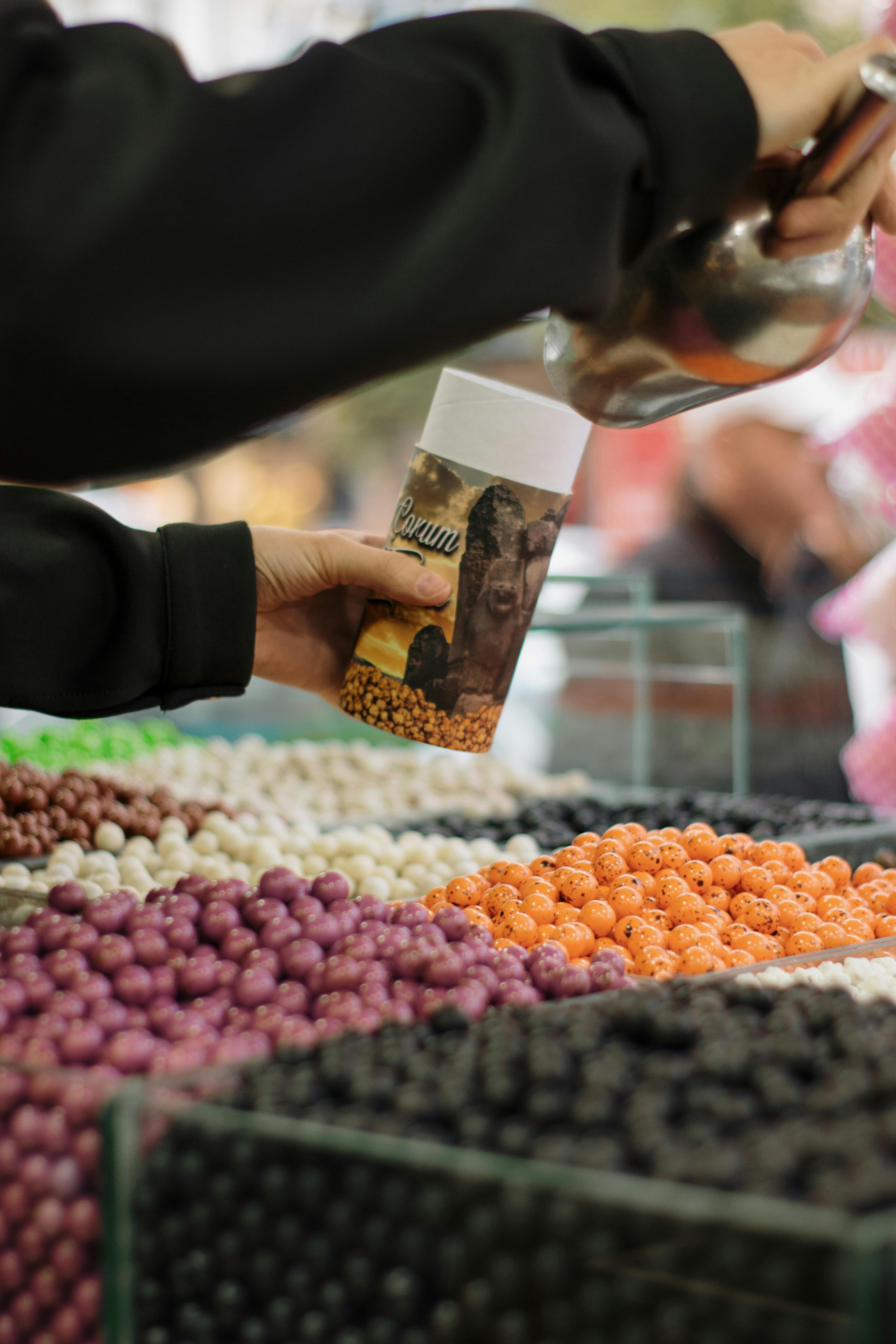 Seller Hands over Snacks on Street Market in Turkey · Free Stock Photo