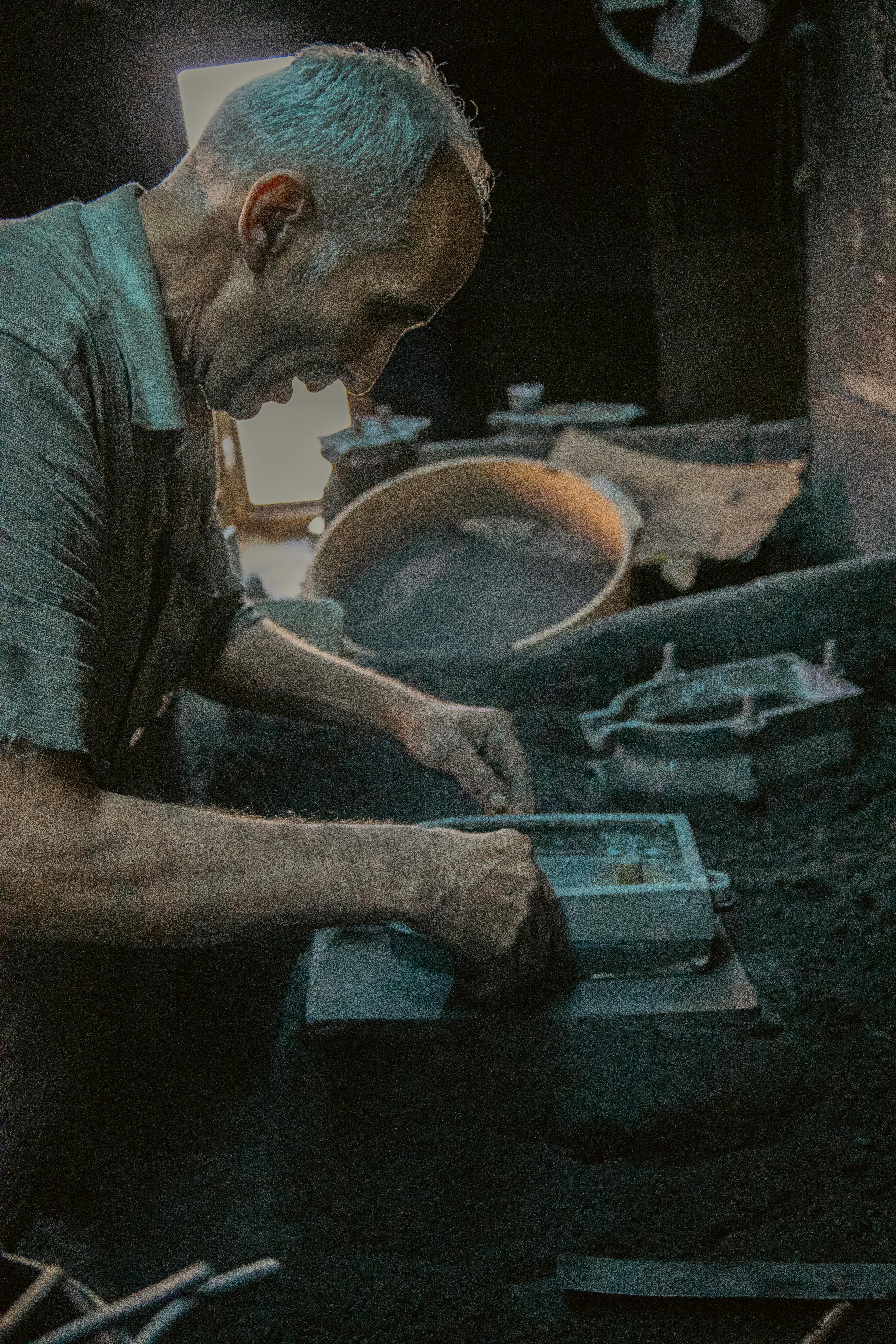 Man Forging Metal · Free Stock Photo