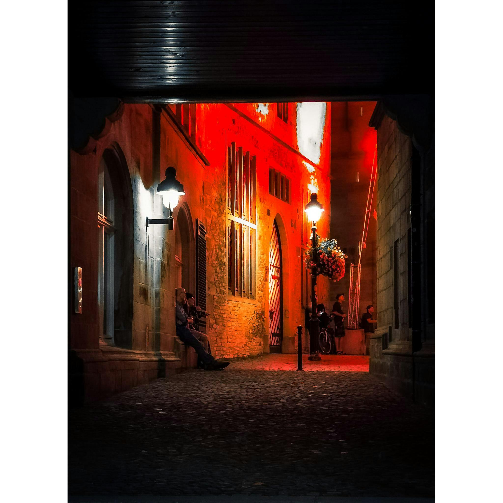 Red Brick Buildings along Cobblestone Street · Free Stock Photo