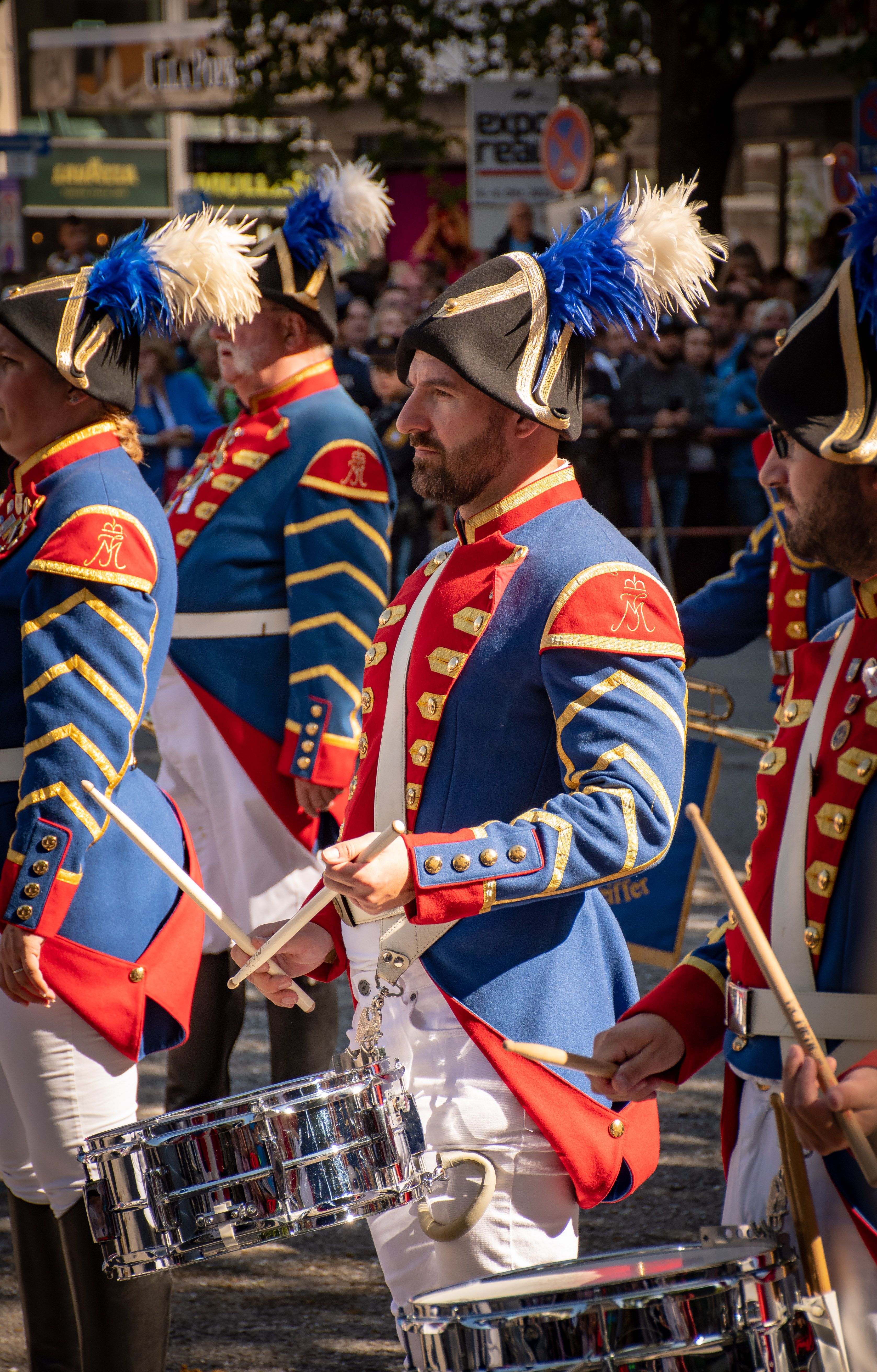 Man Playing Drums in Traditional Clothing on Parade · Free Stock Photo