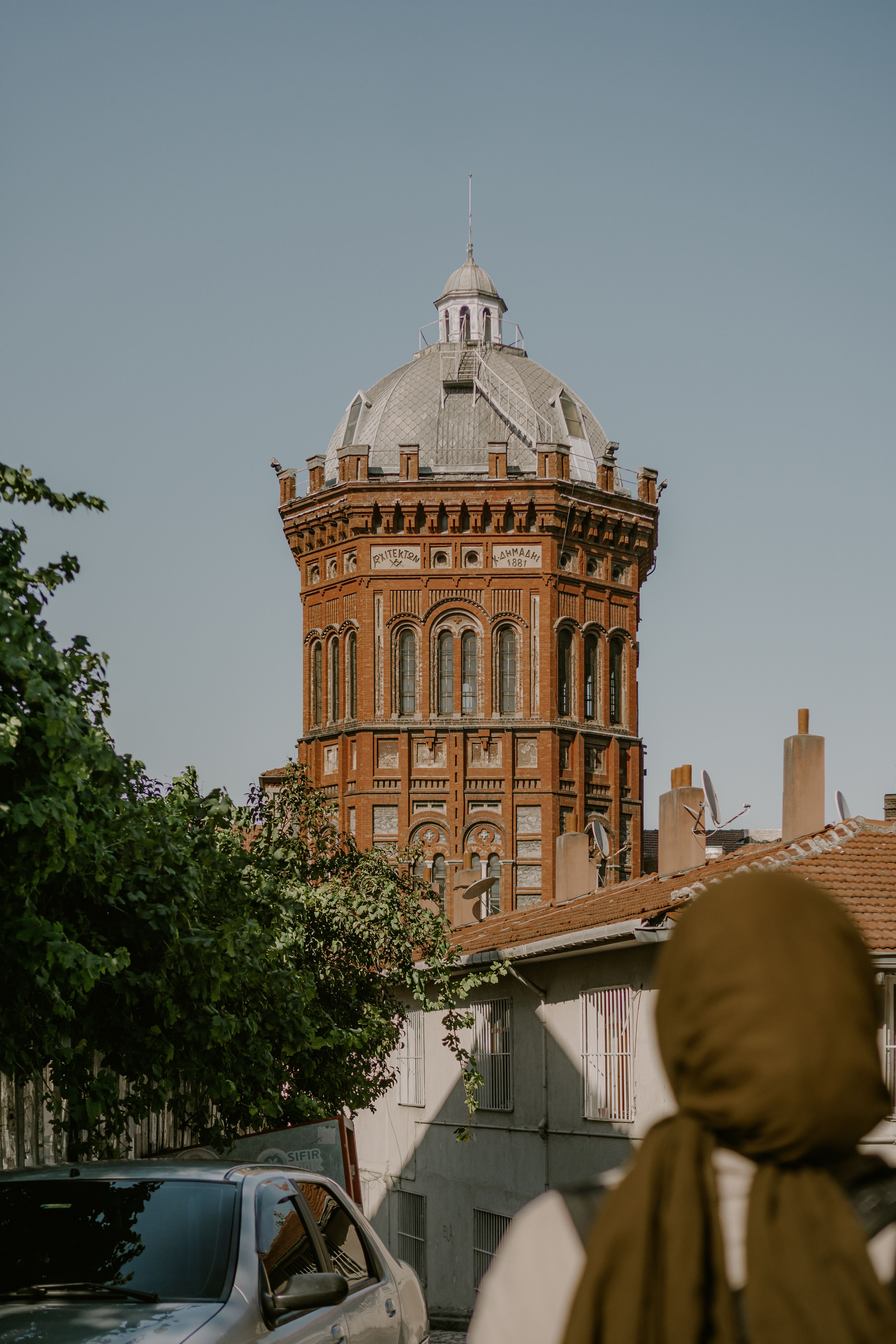 Woman in Hijab and Tower of Private Fener Greek High School in Istanbul ...