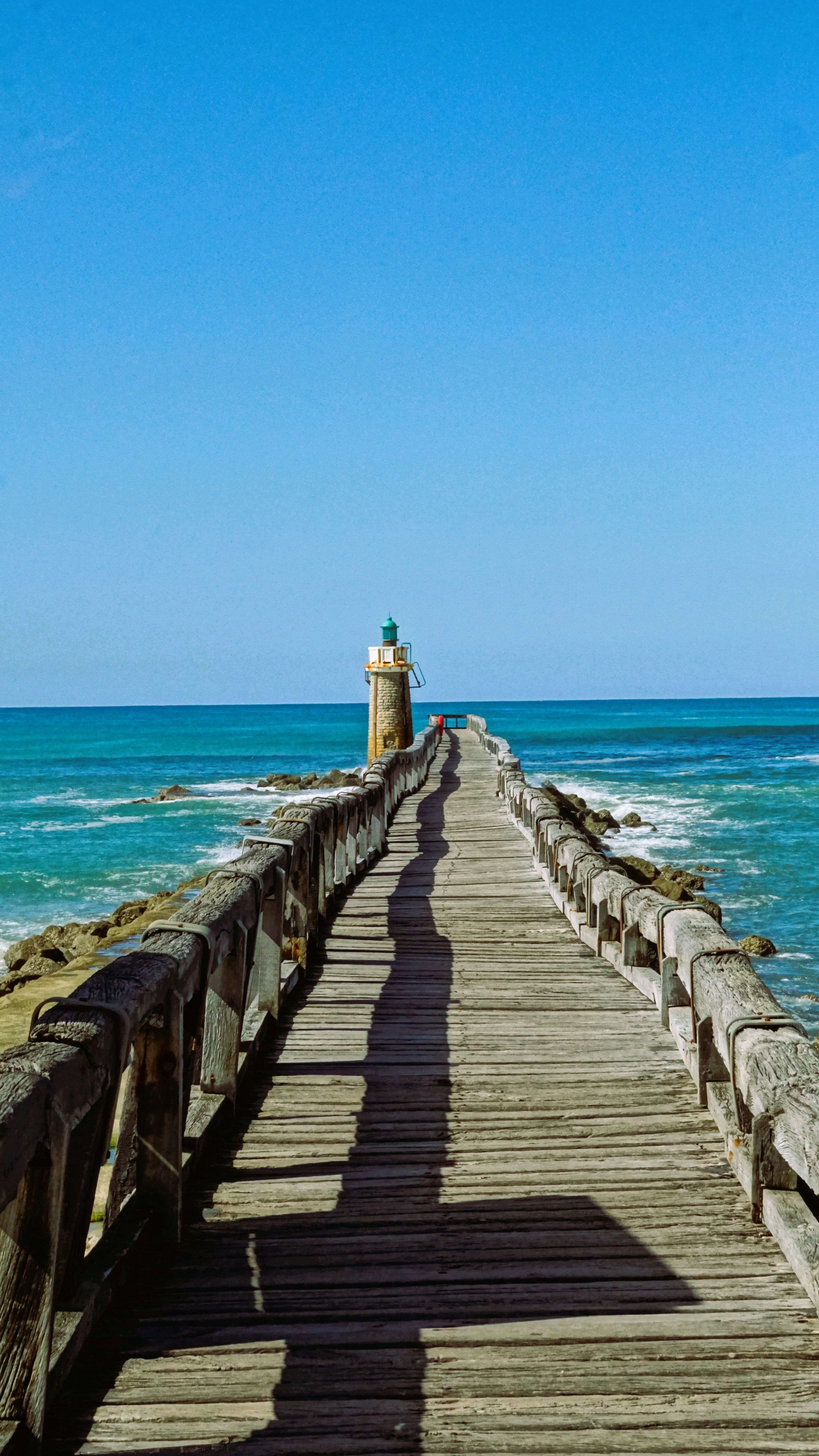 Foto de stock gratuita sobre de madera, faro, mar, muelle, oceano, tiro ...