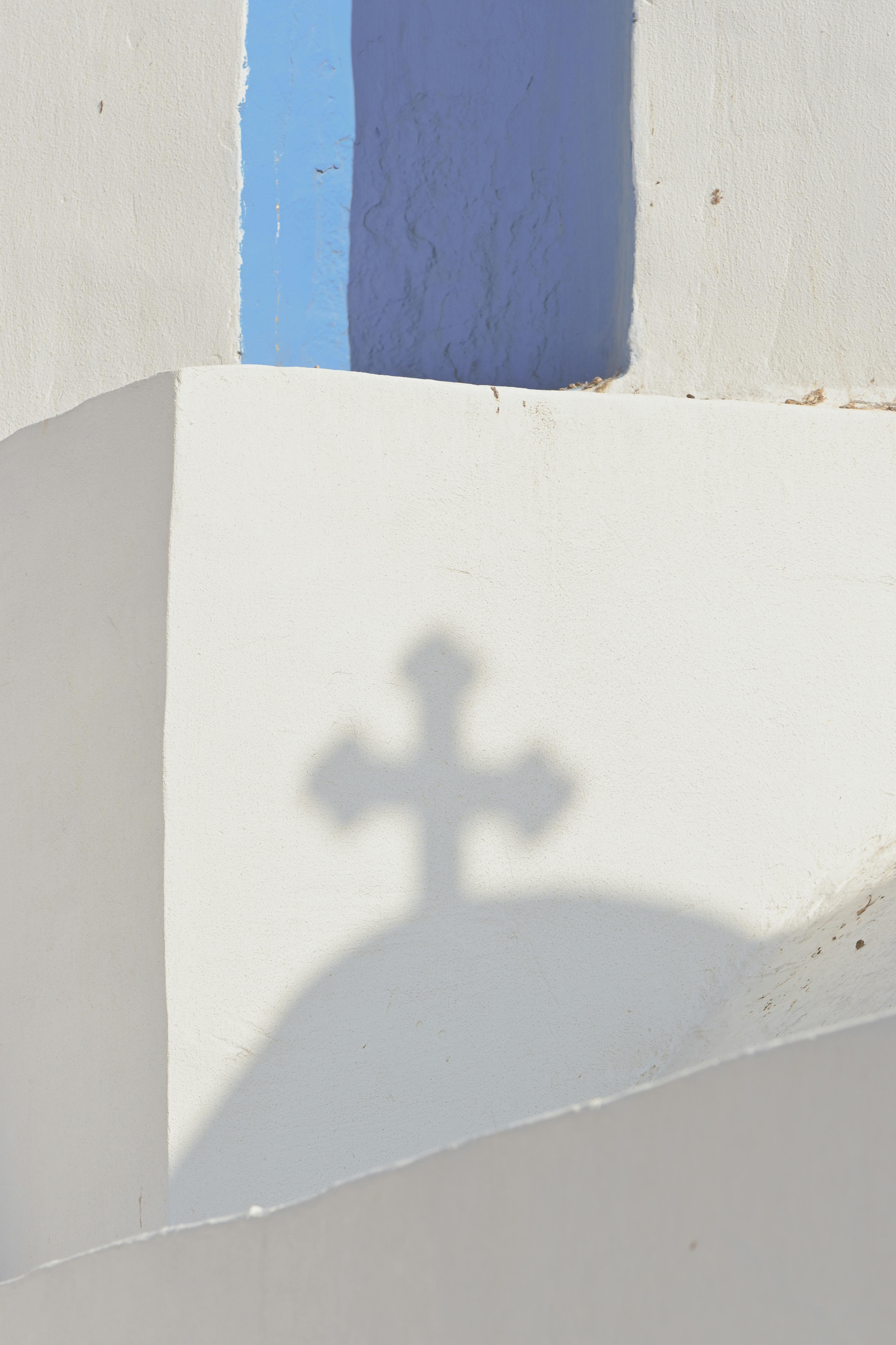 Cross Shadow on Wall · Free Stock Photo