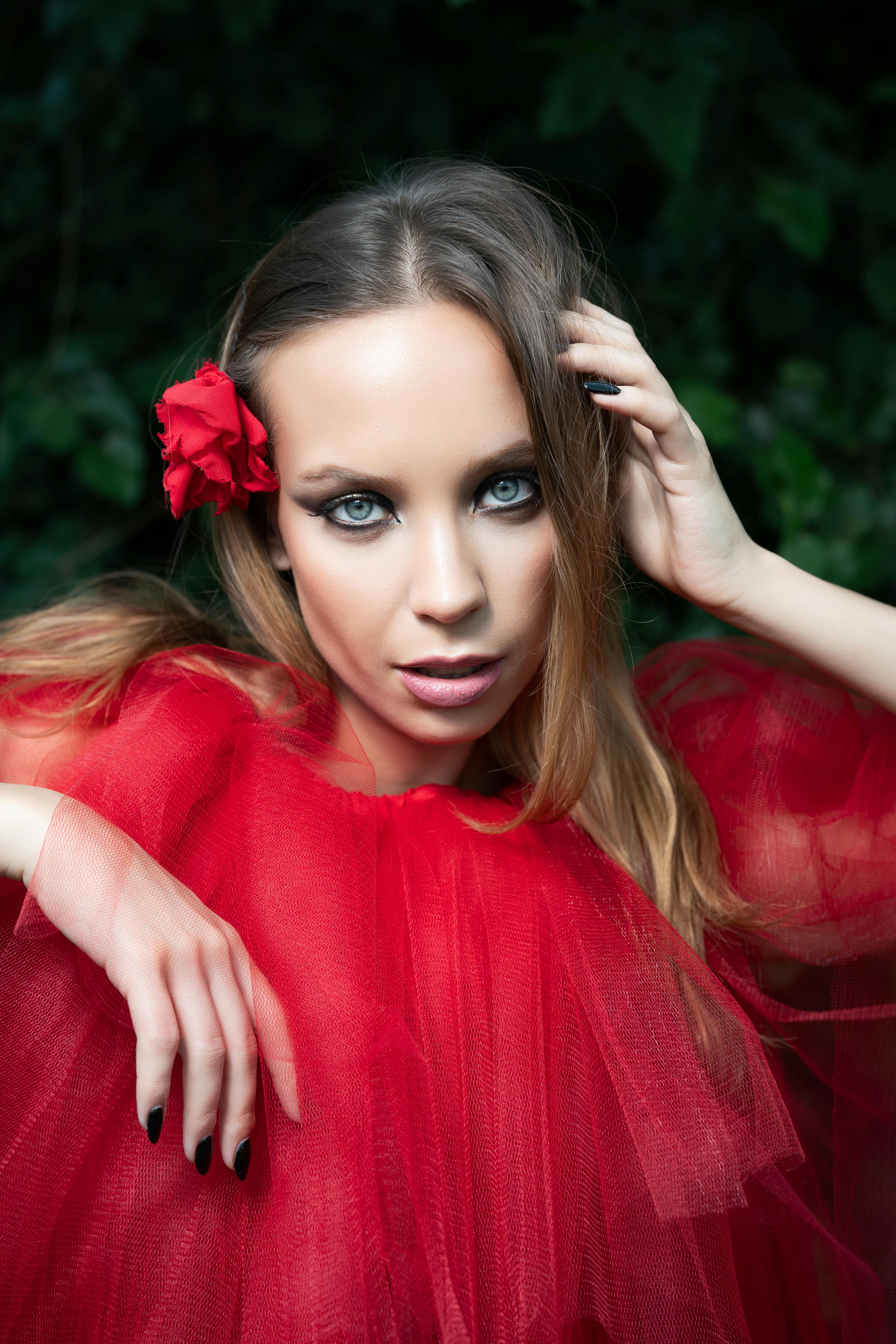 Portrait of a Female Model Wearing a Red Dress · Free Stock Photo