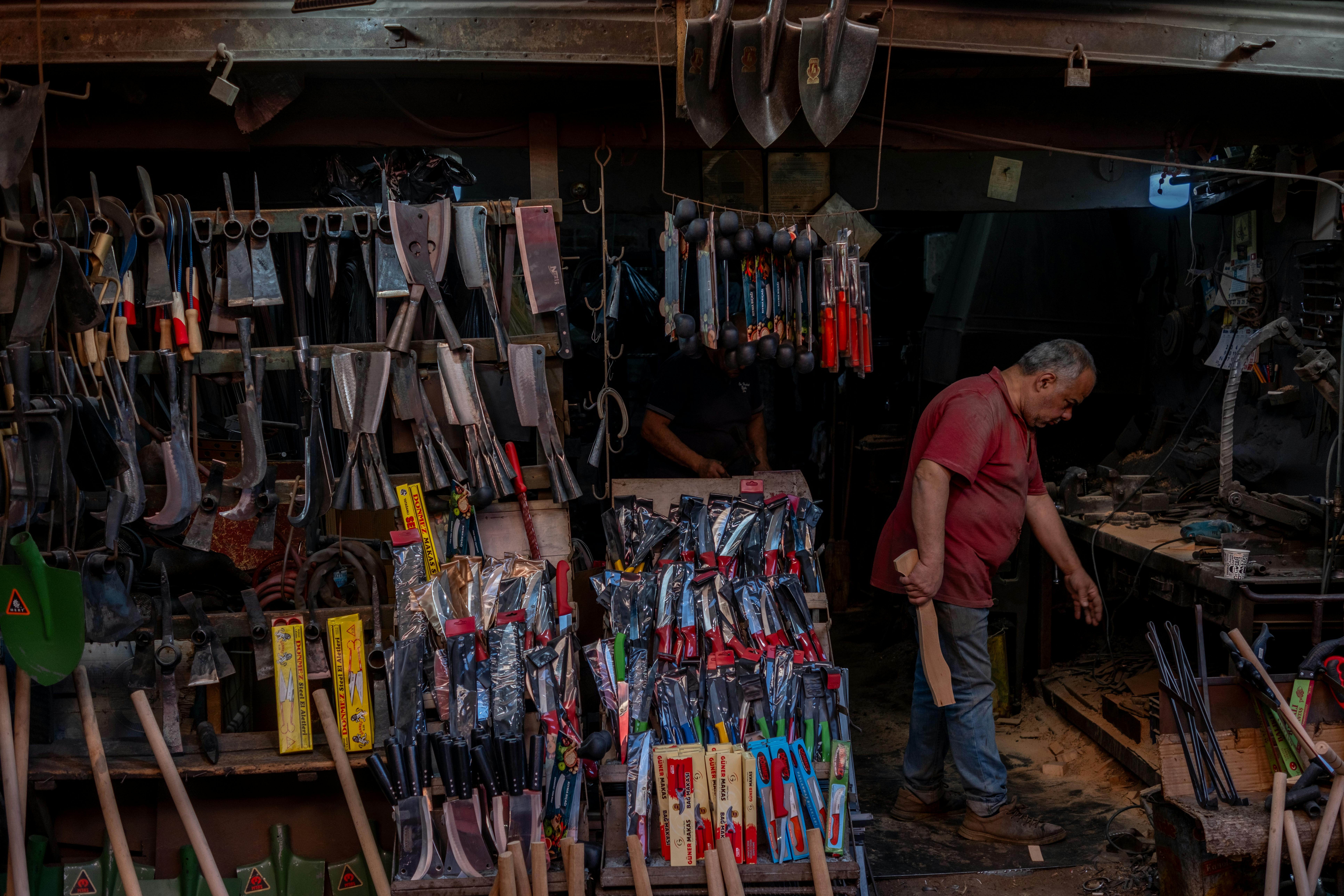 Elderly Man in a Workshop · Free Stock Photo