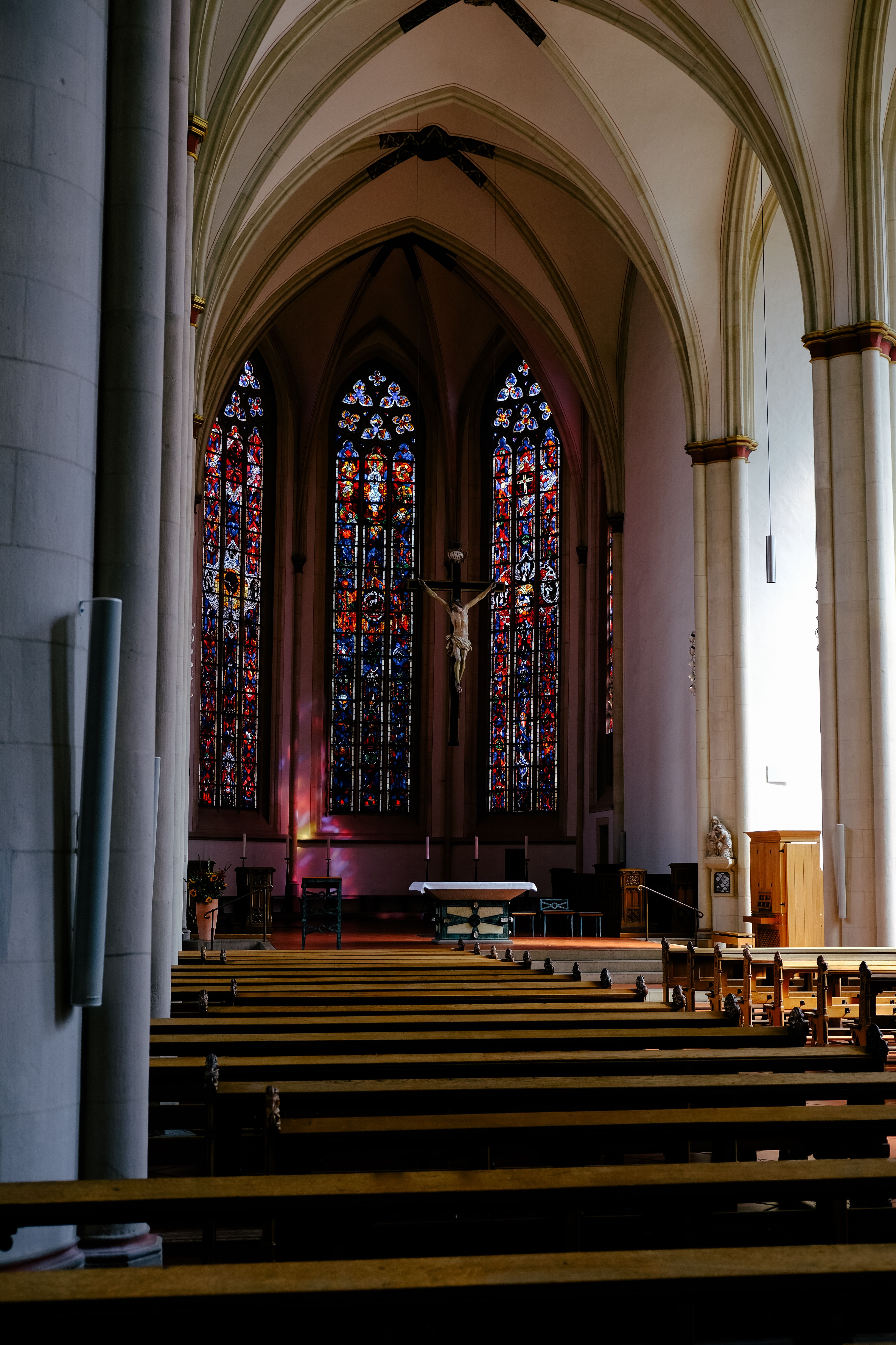 The Altar and Stained Glass Windows in a Church · Free Stock Photo