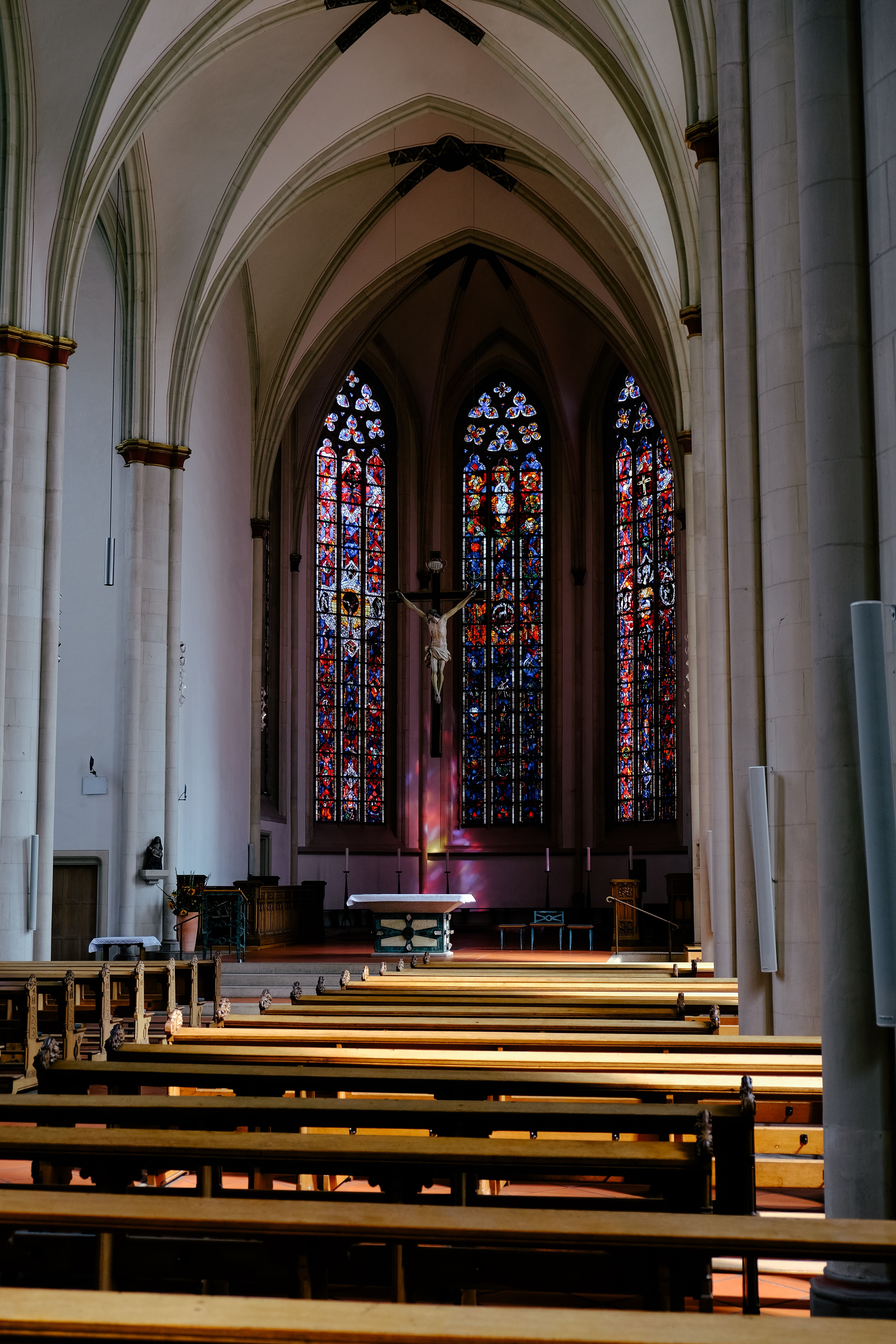 The Altar and Stained Glass Windows in a Church · Free Stock Photo