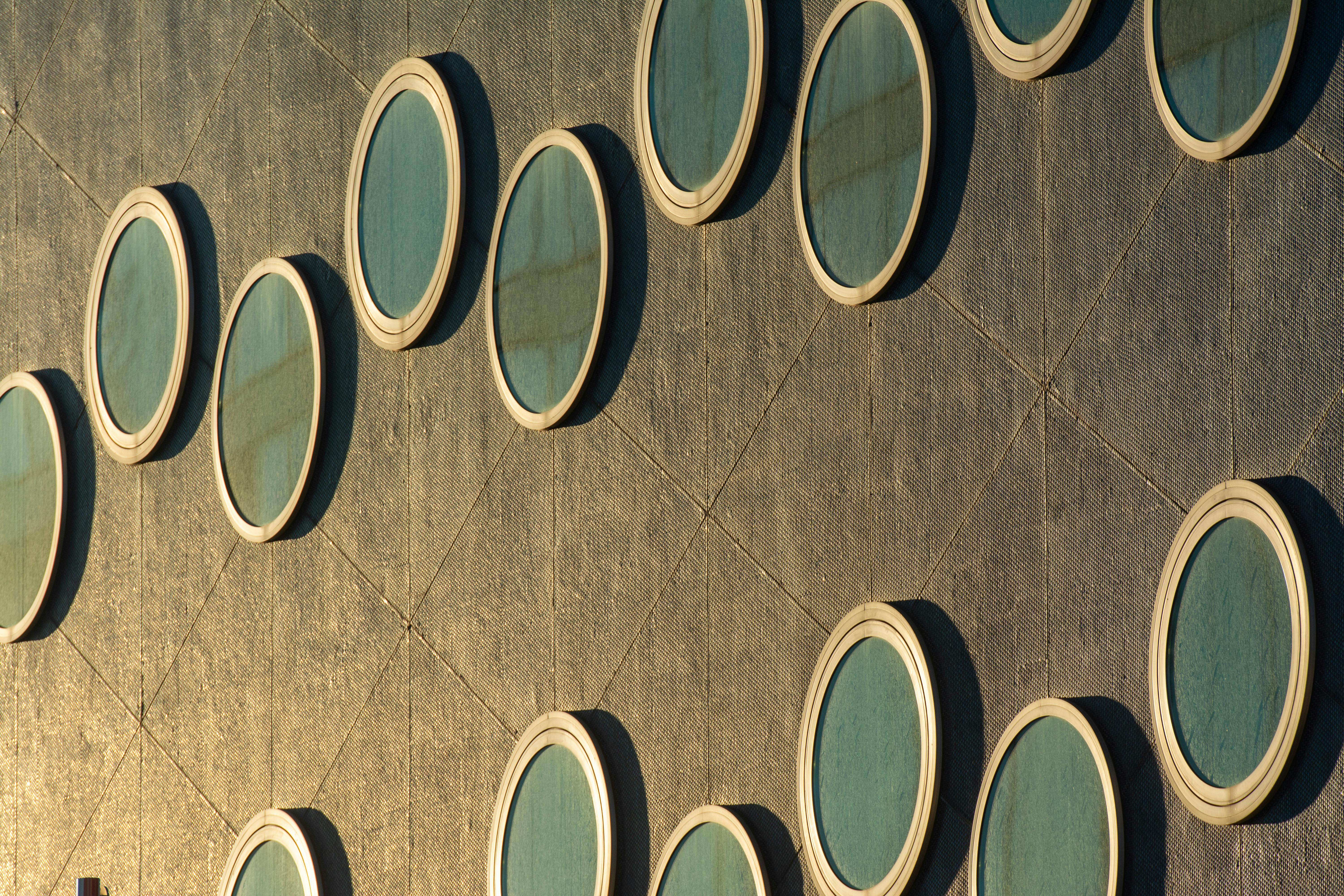 Round Windows on Wall · Free Stock Photo