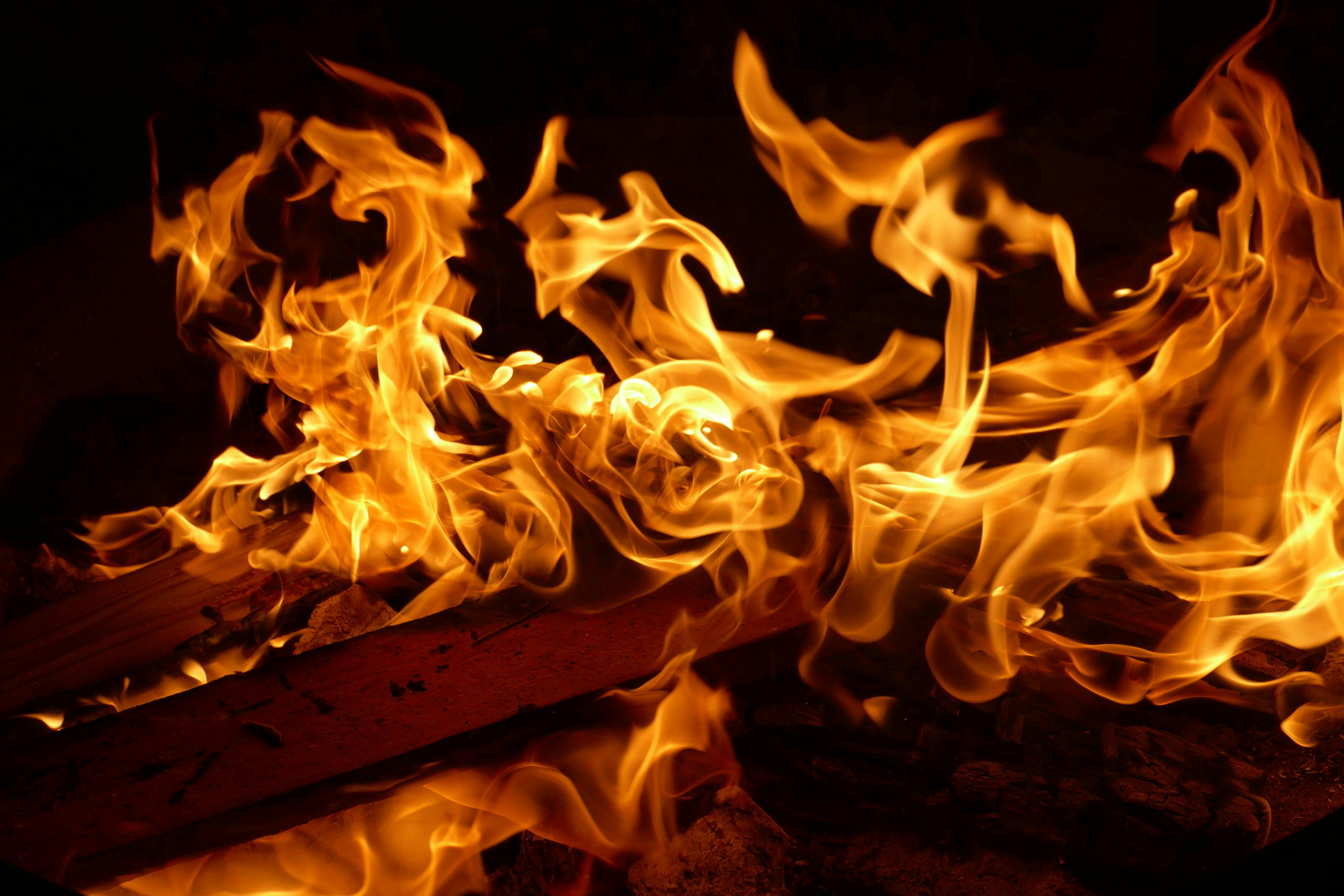 Wood Planks in Yellow Flames · Free Stock Photo
