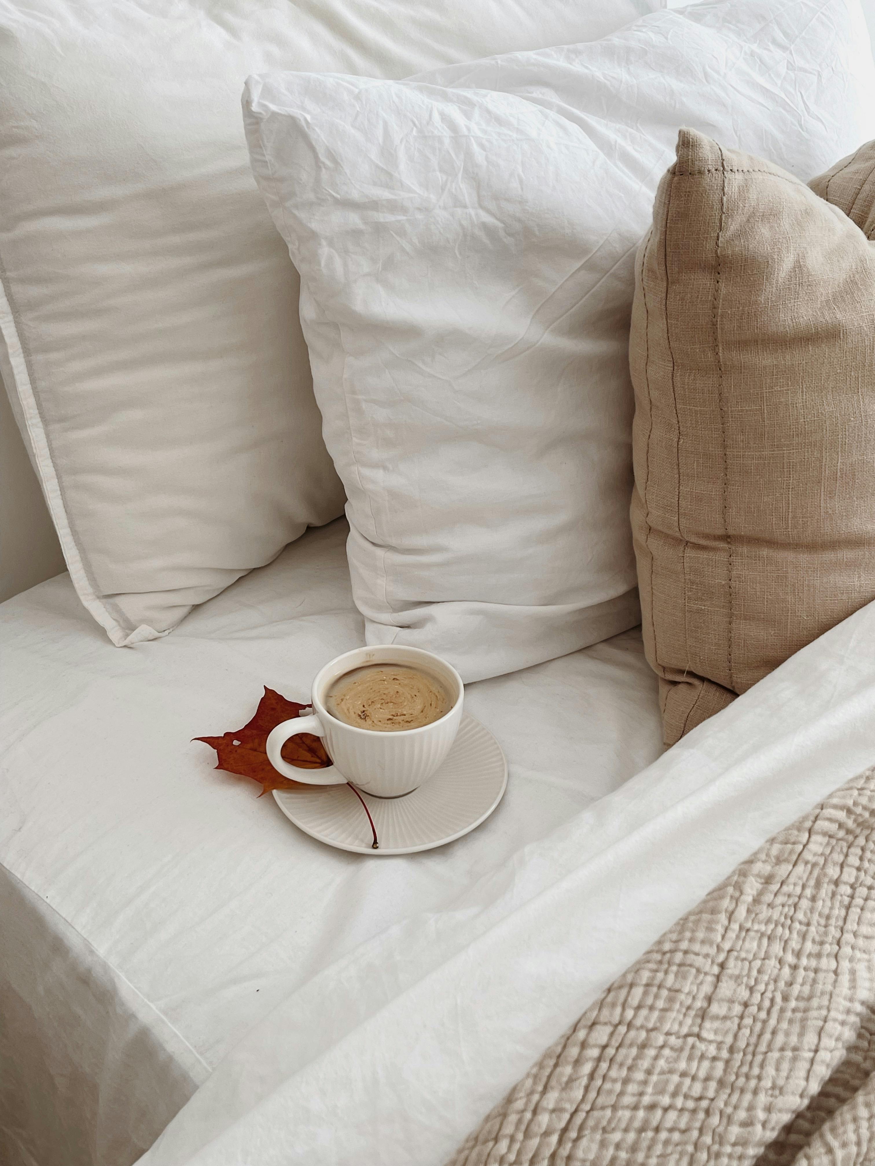 Cup of Coffee on Bed · Free Stock Photo