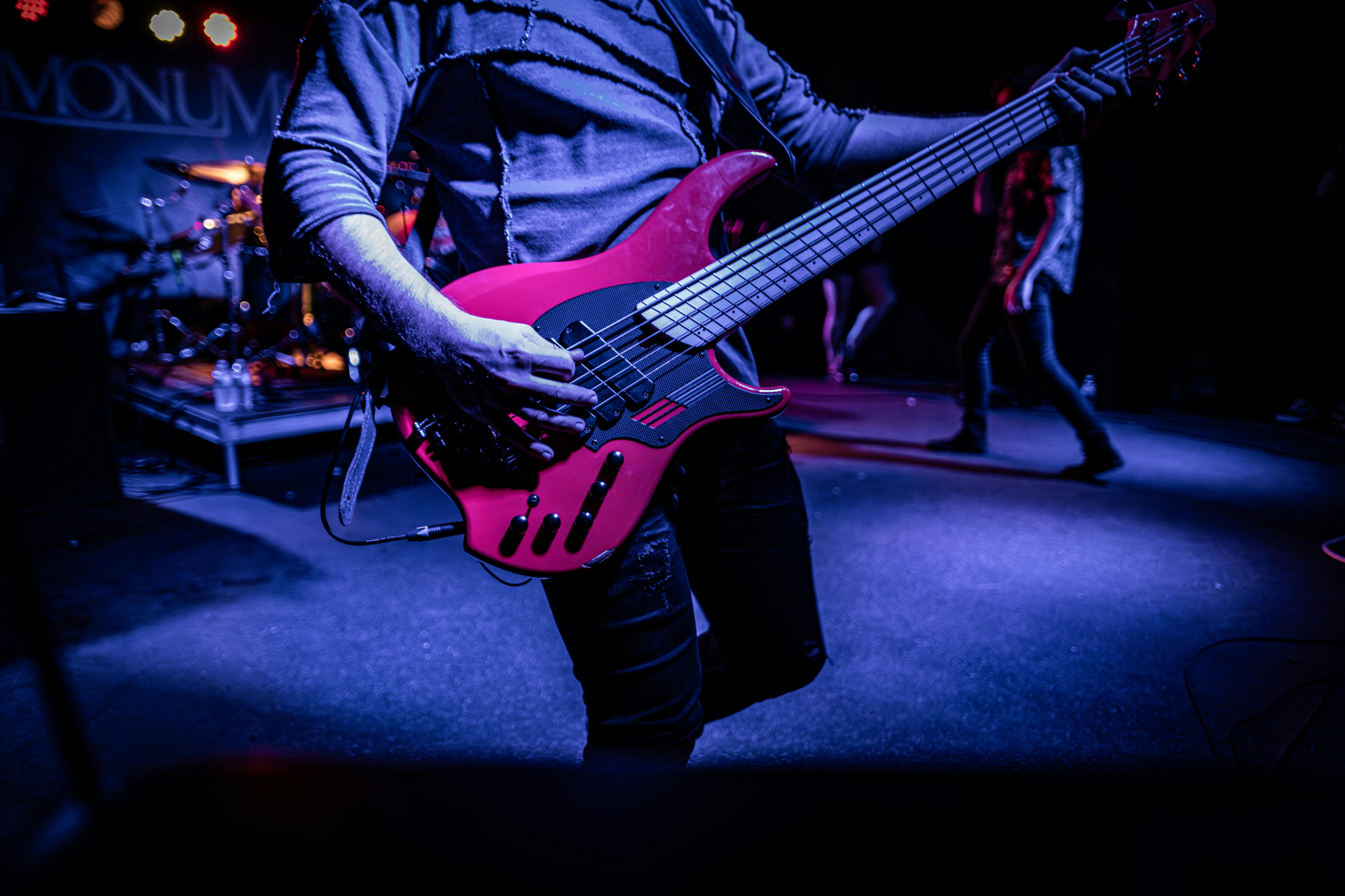 Man Playing Bass Guitar · Free Stock Photo
