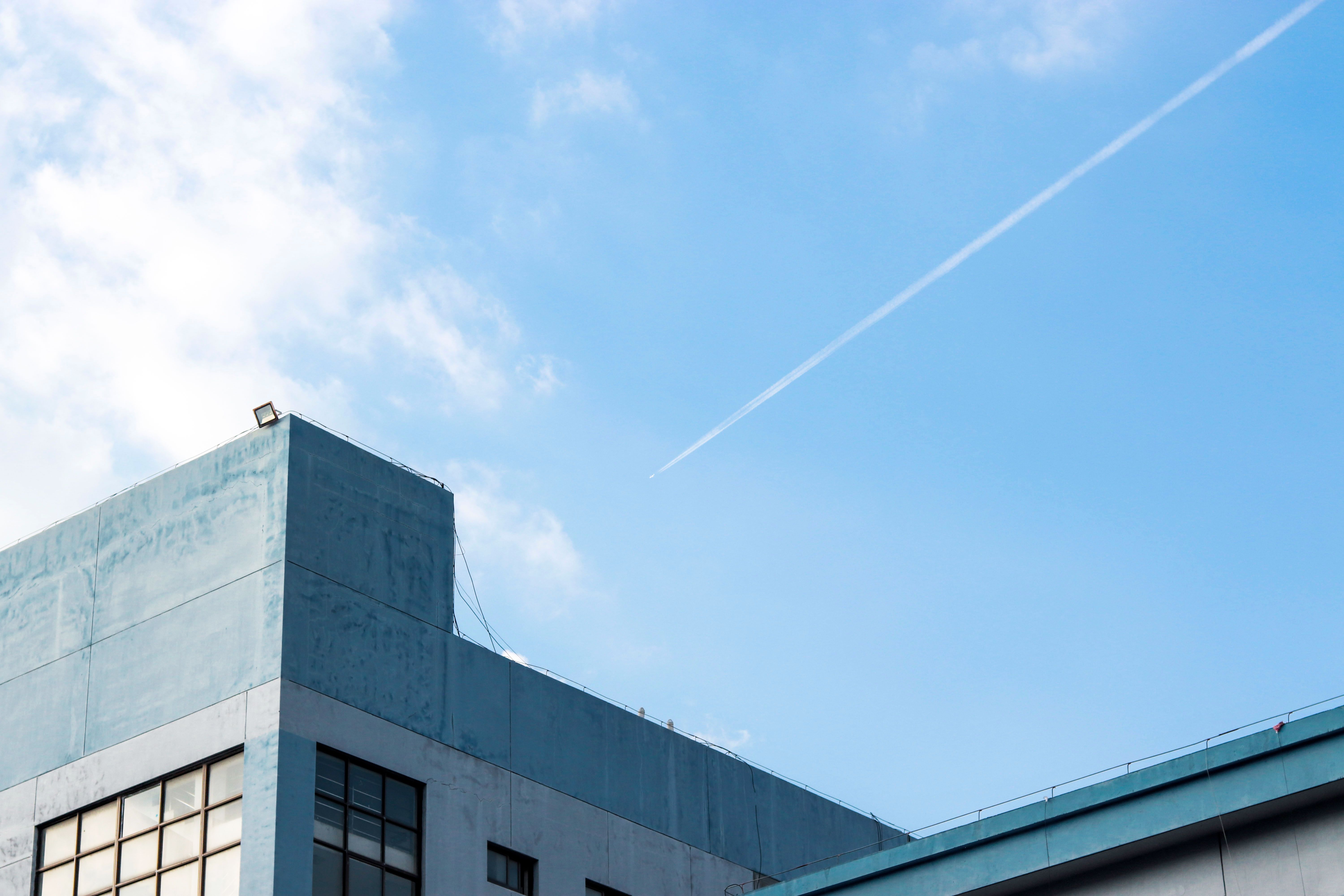 Top Corner of Blue Building · Free Stock Photo