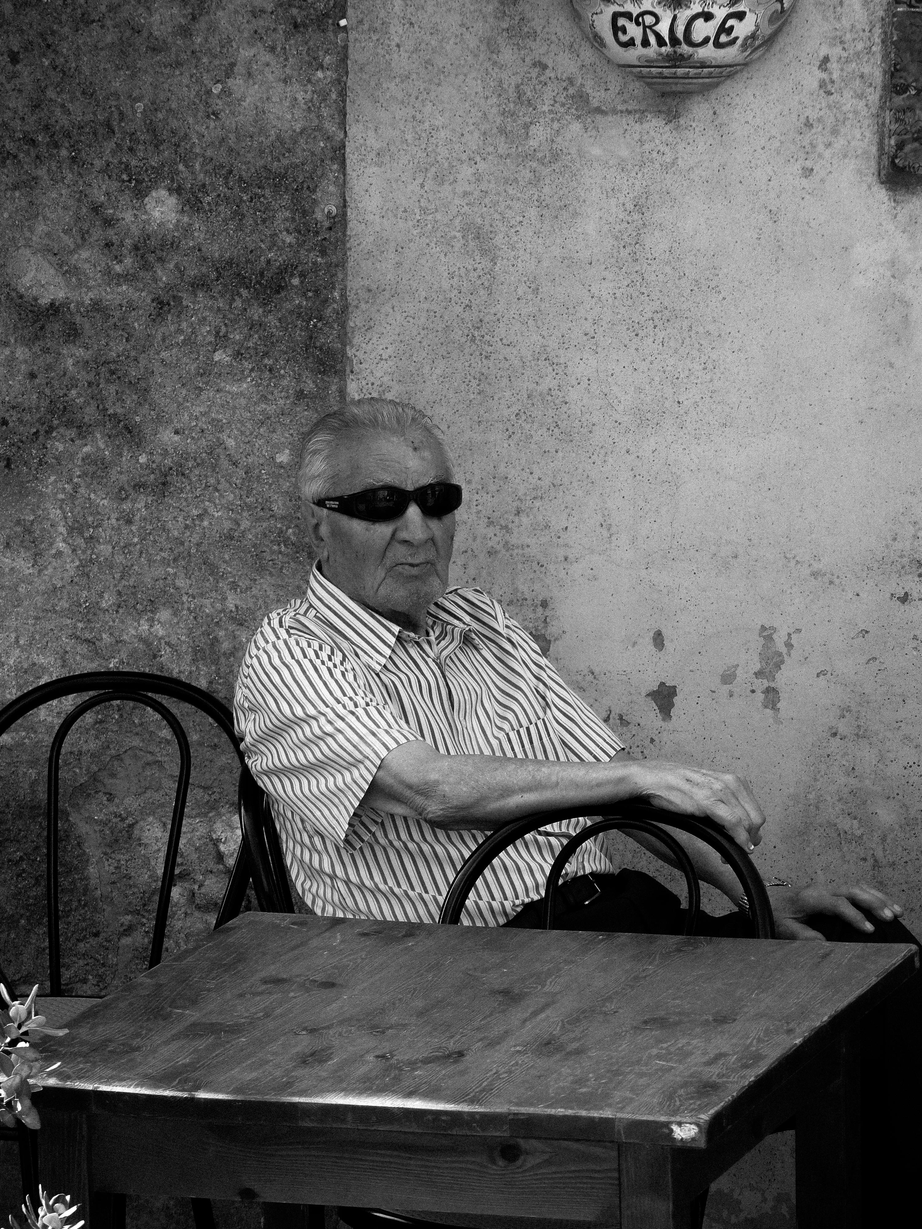 Calm Old Man Getting Up From Chair In A Cafe Photos, Download The BEST ...