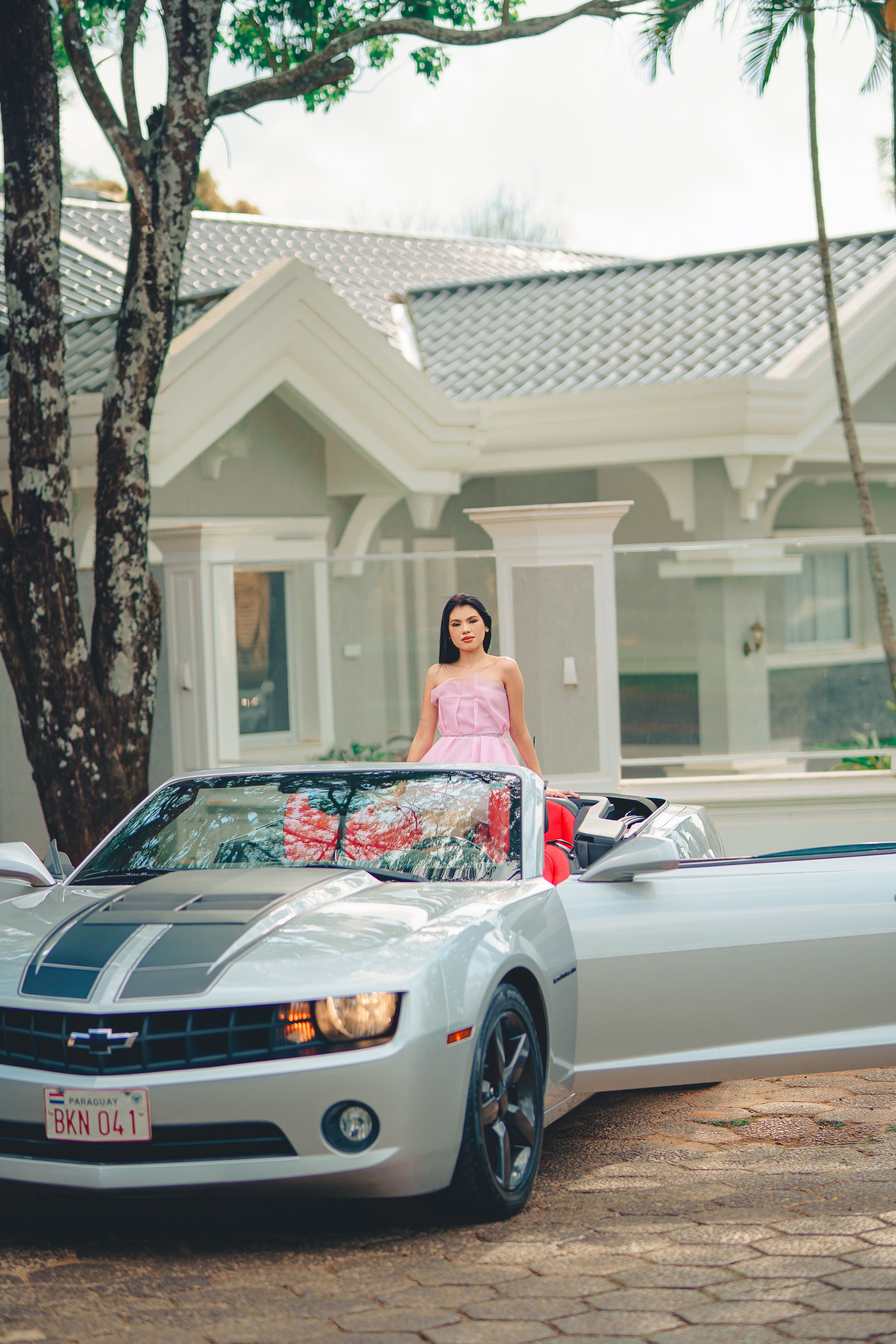 Woman Sitting inside Silver Chevrolet Camaro Convertible · Free Stock Photo