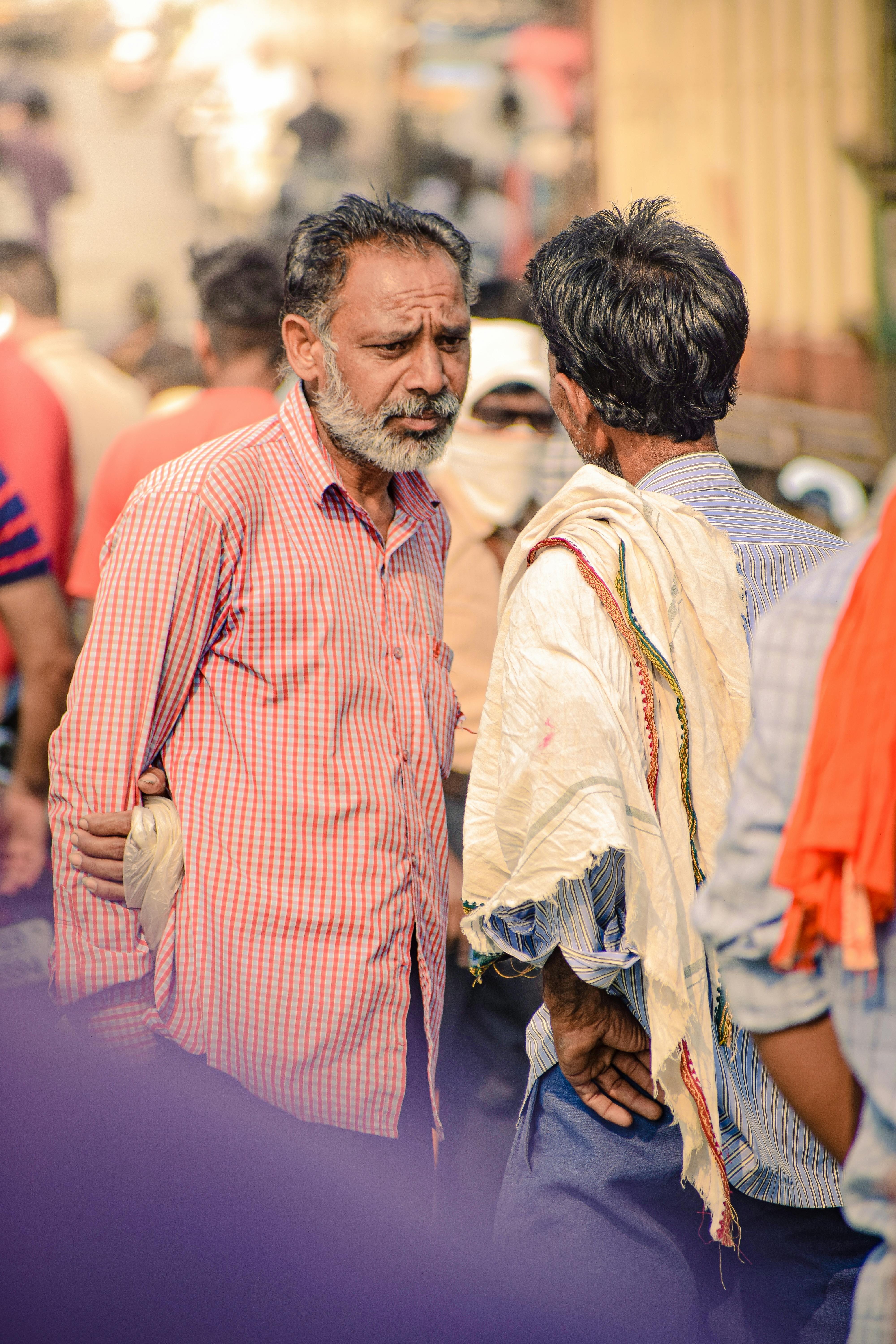 Two man having conversation · Free Stock Photo