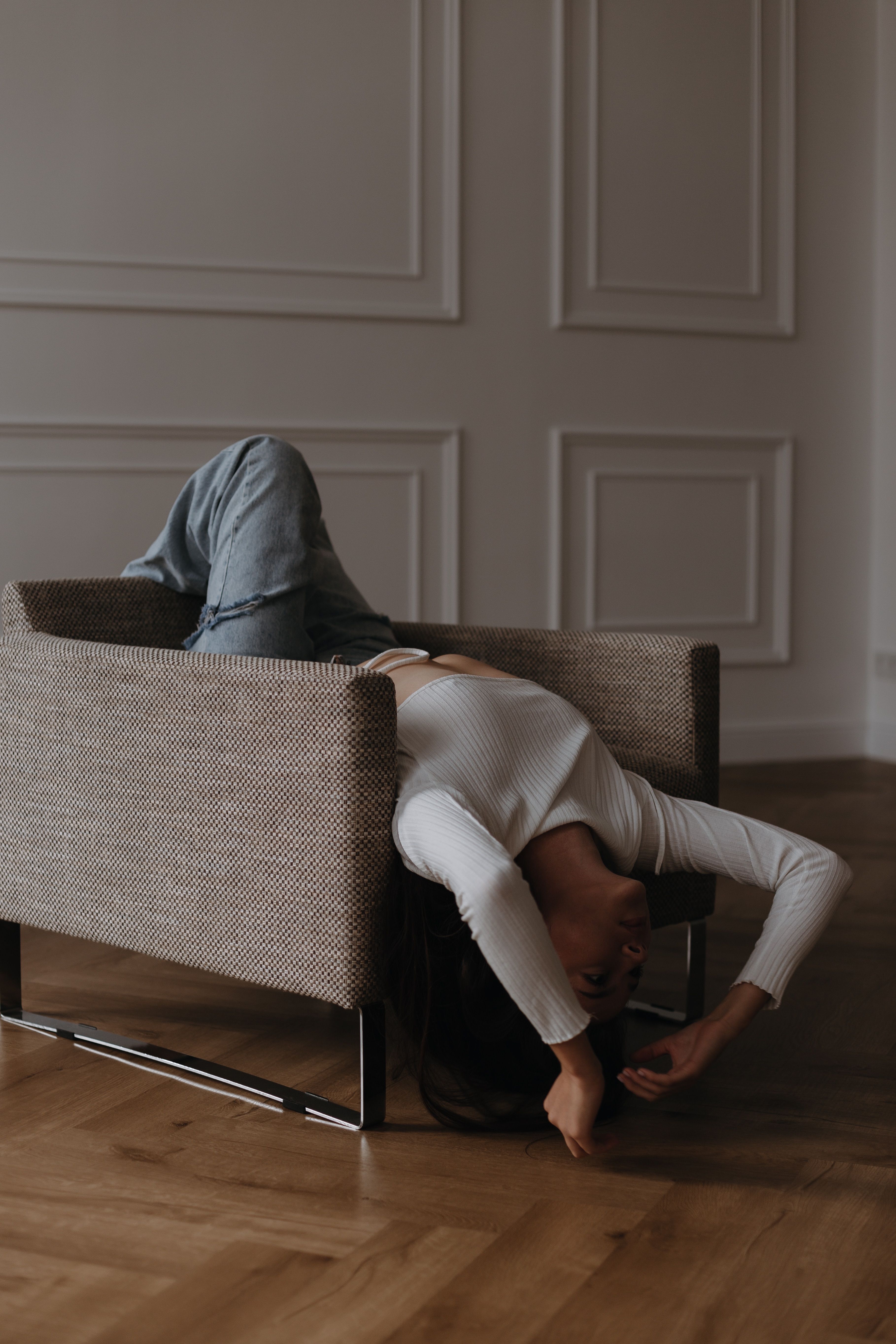 Woman Lying Curled up on Floor · Free Stock Photo