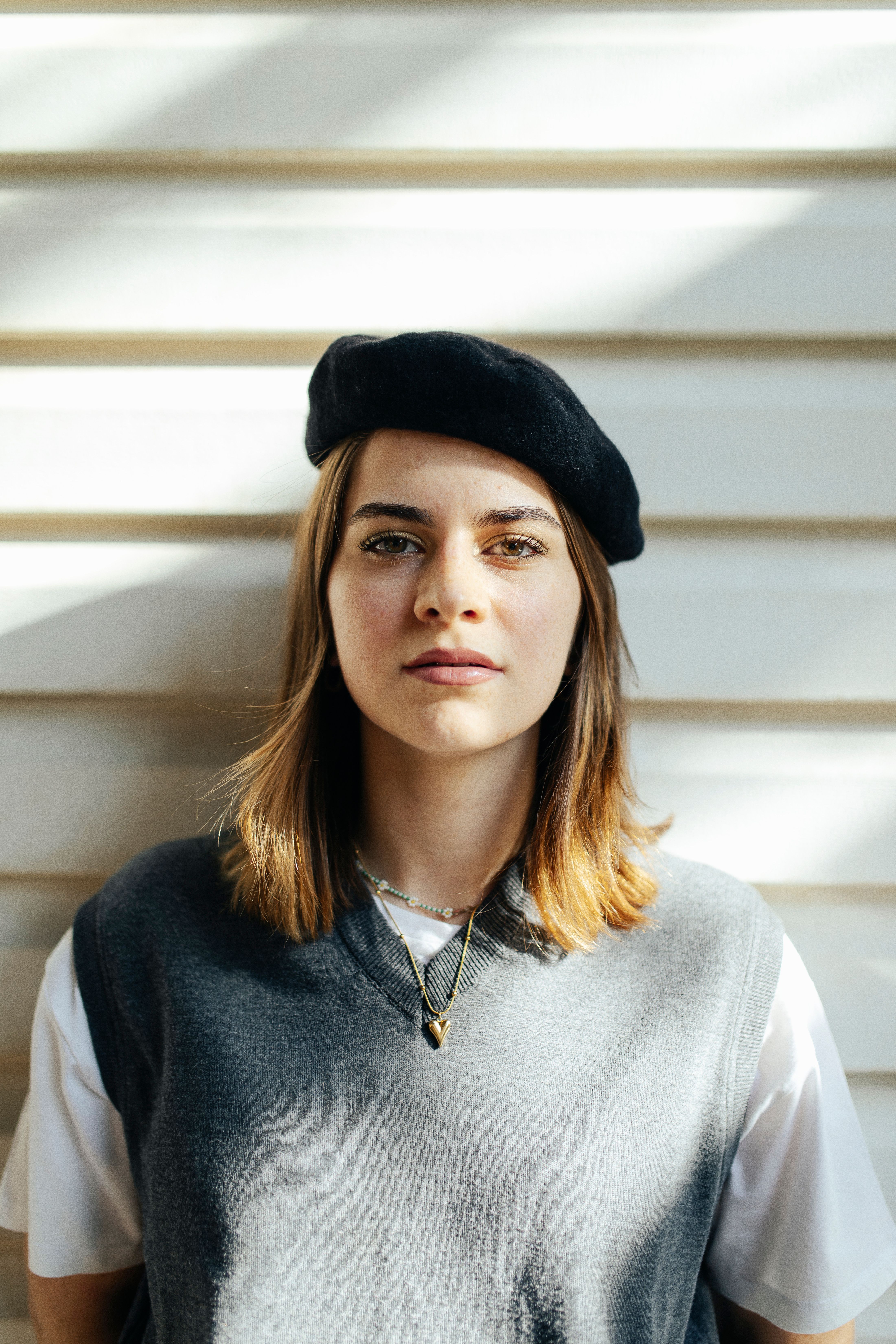 Portrait of a Pretty Blonde Wearing a Beret · Free Stock Photo