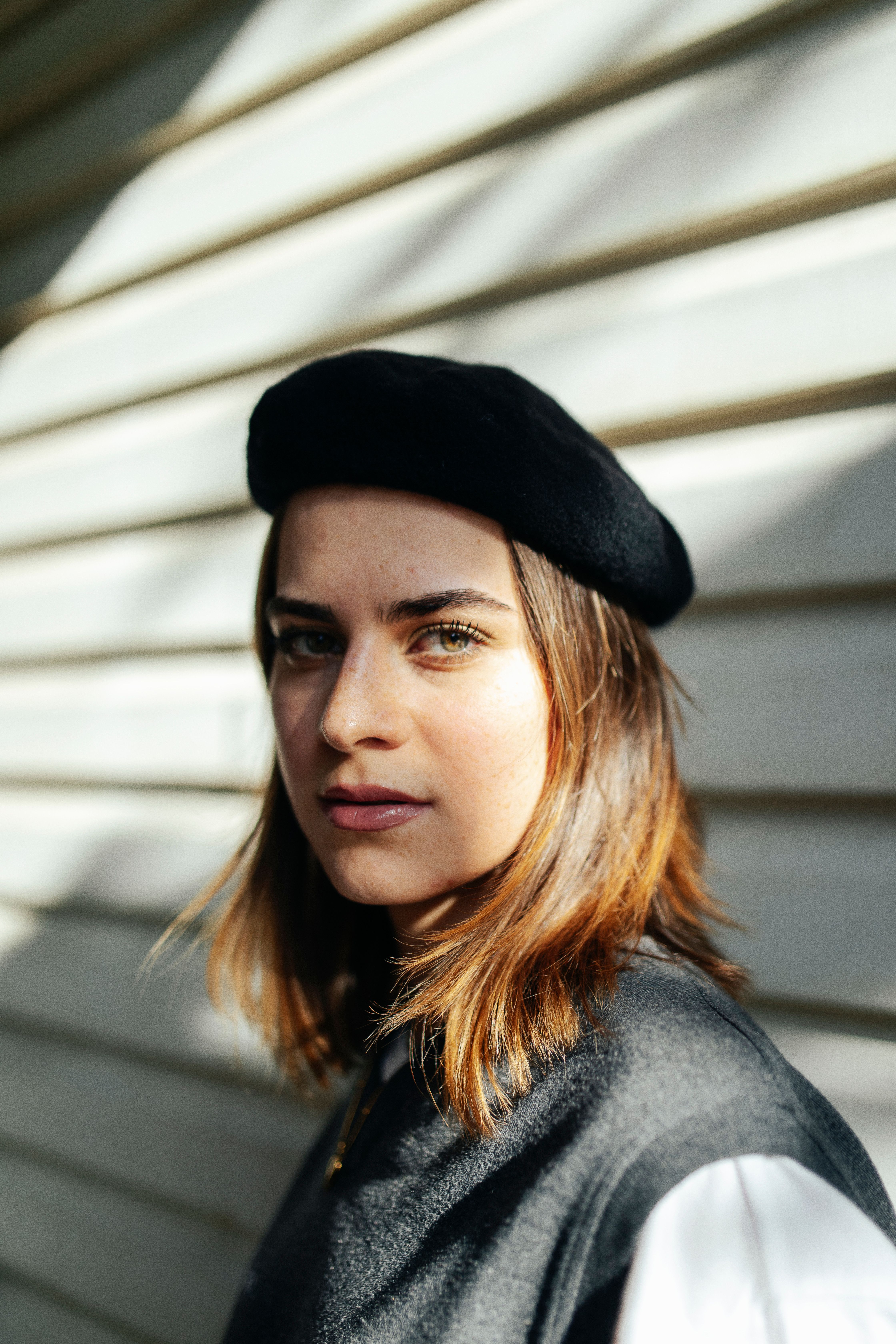Portrait of a Female Model Wearing a Beret · Free Stock Photo