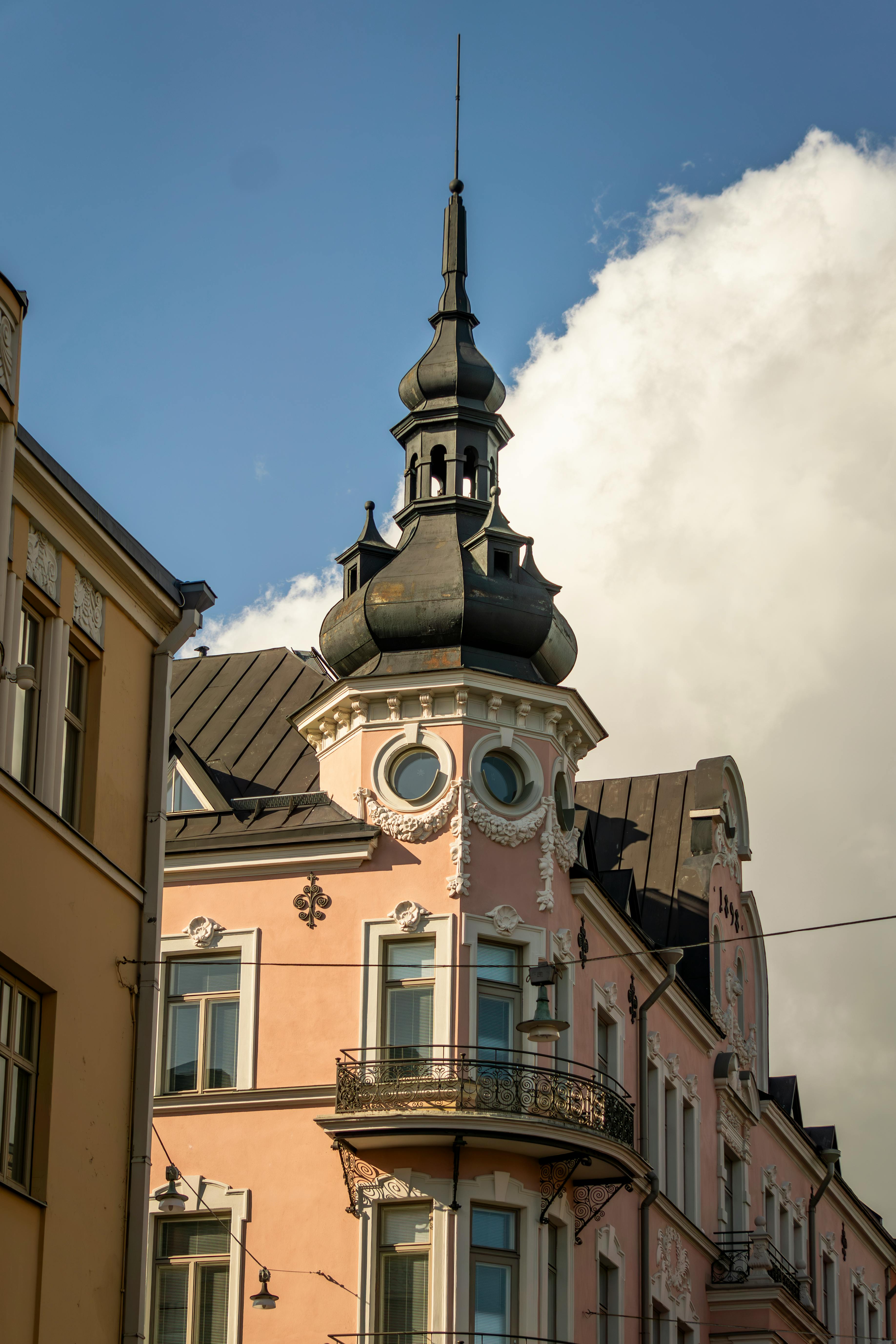 Ornamented Building with Tower · Free Stock Photo