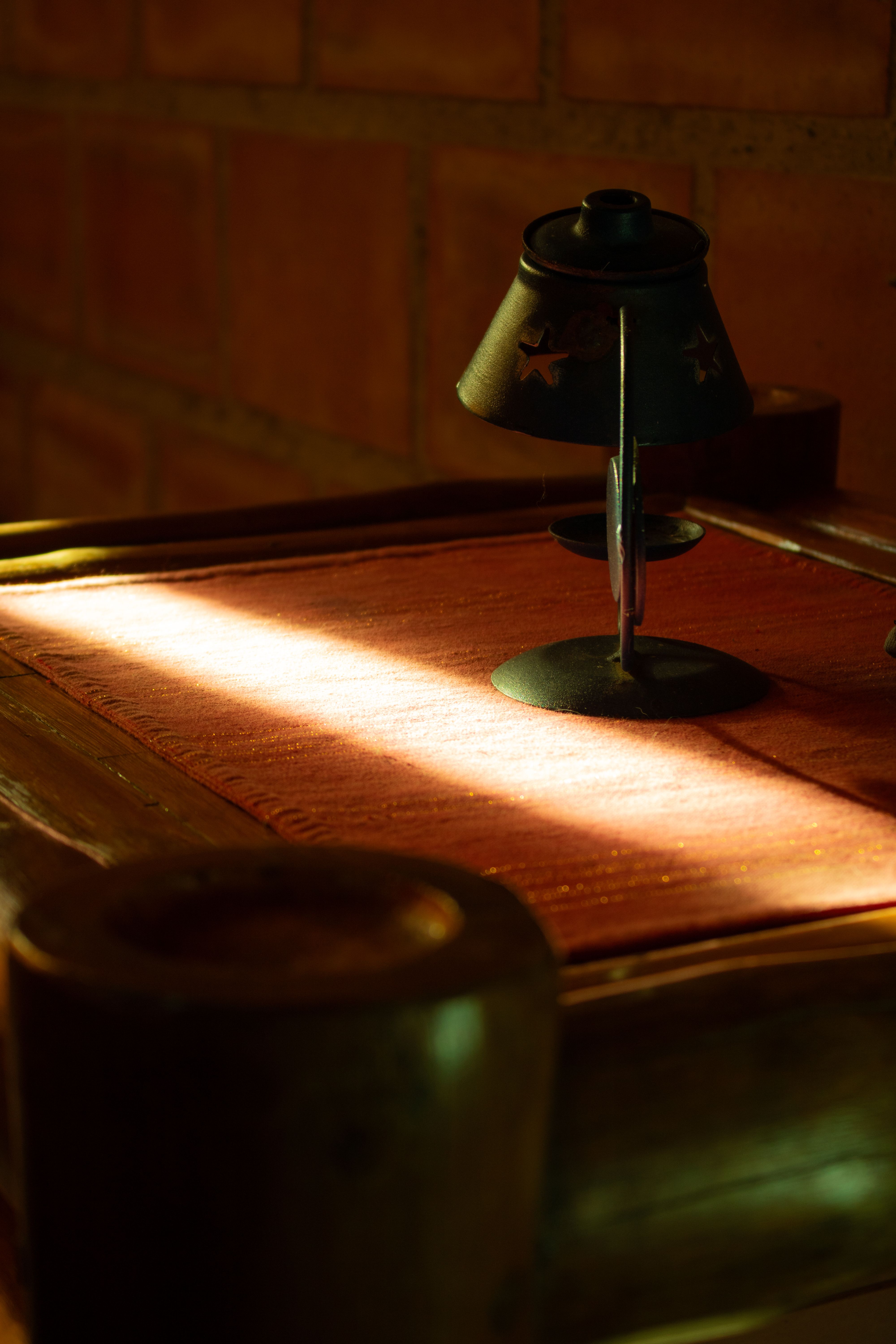 Ray of Sunlight Hitting Wooden Desk · Free Stock Photo