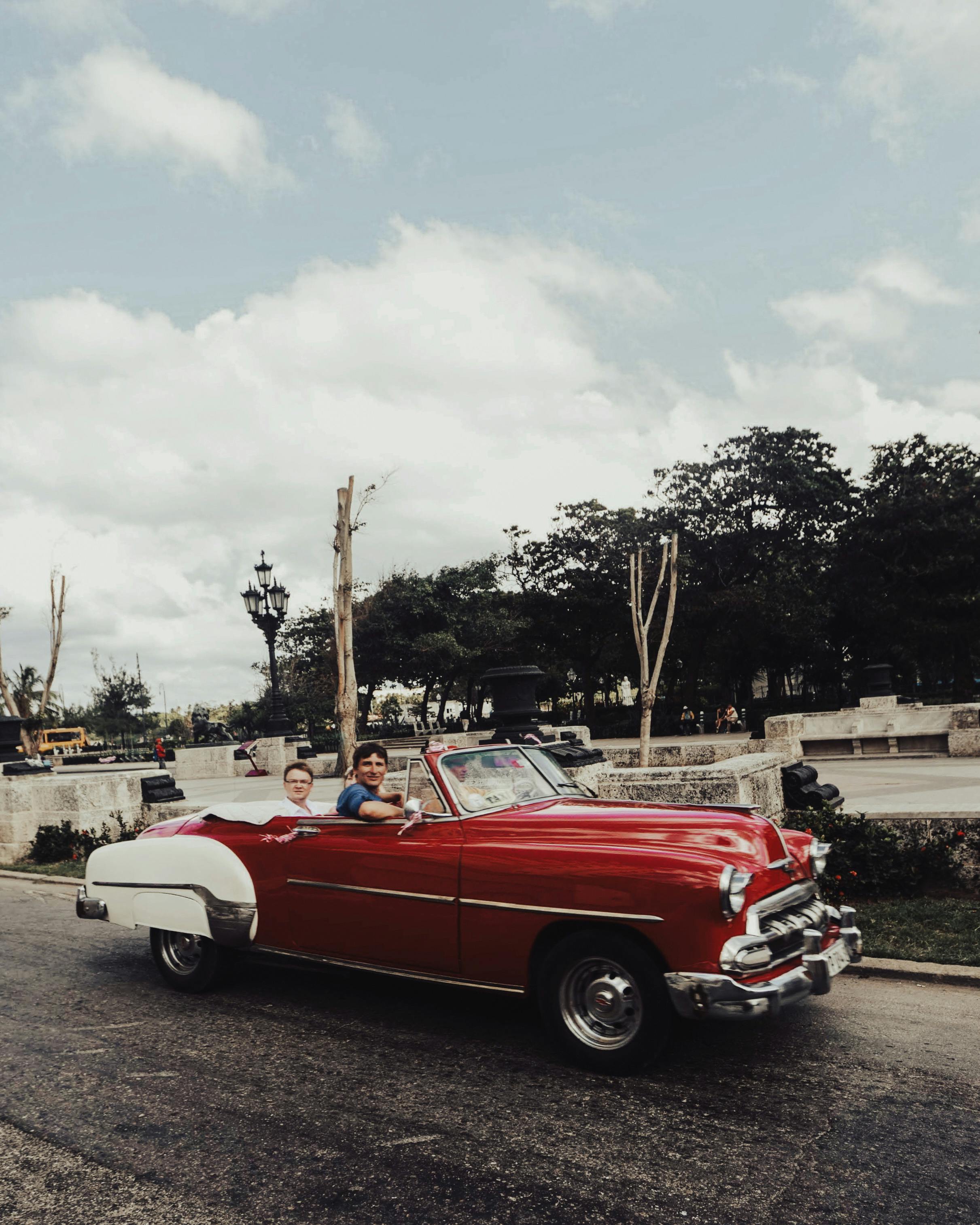 People in Classic Convertible · Free Stock Photo