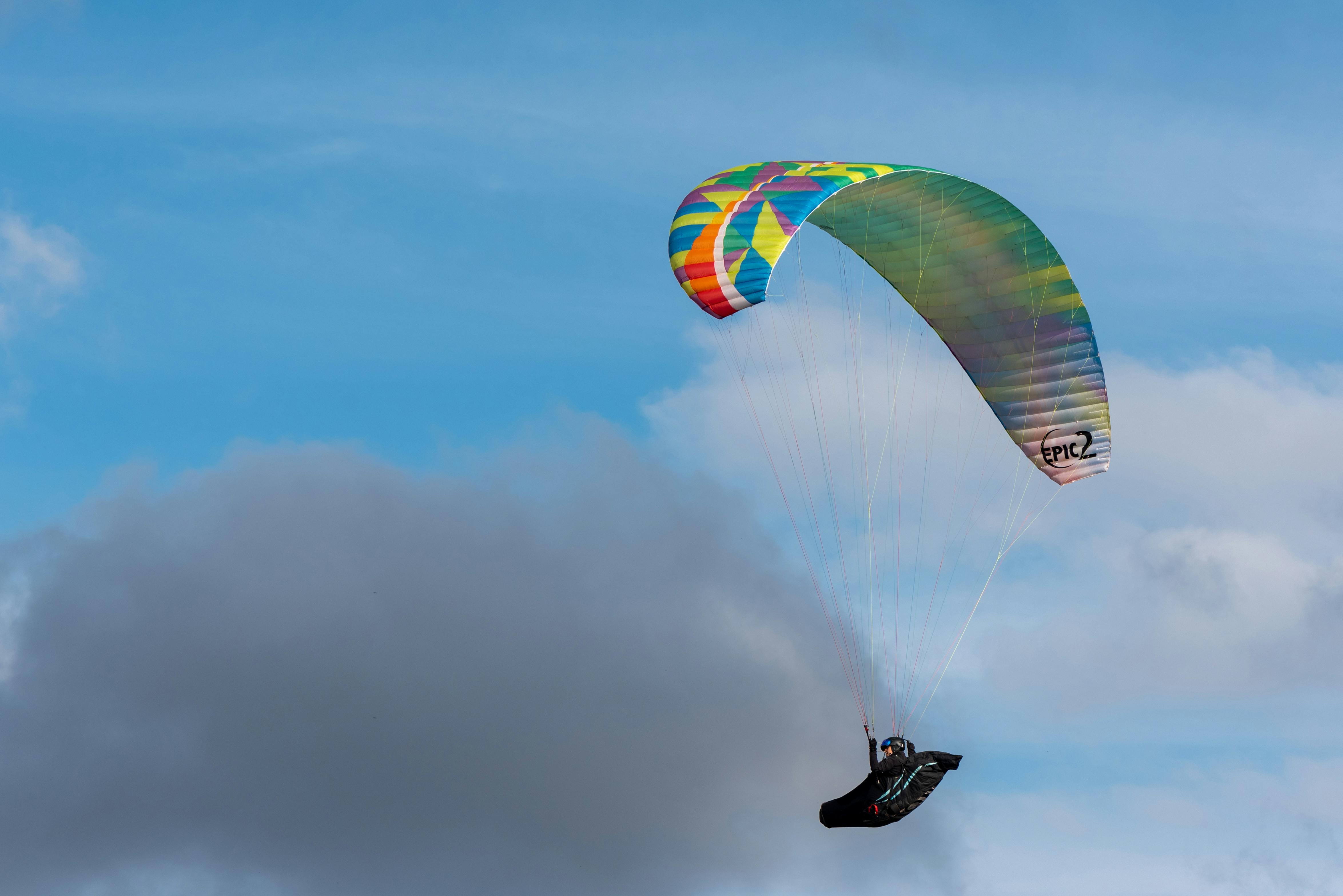Person Parachuting in Sky · Free Stock Photo