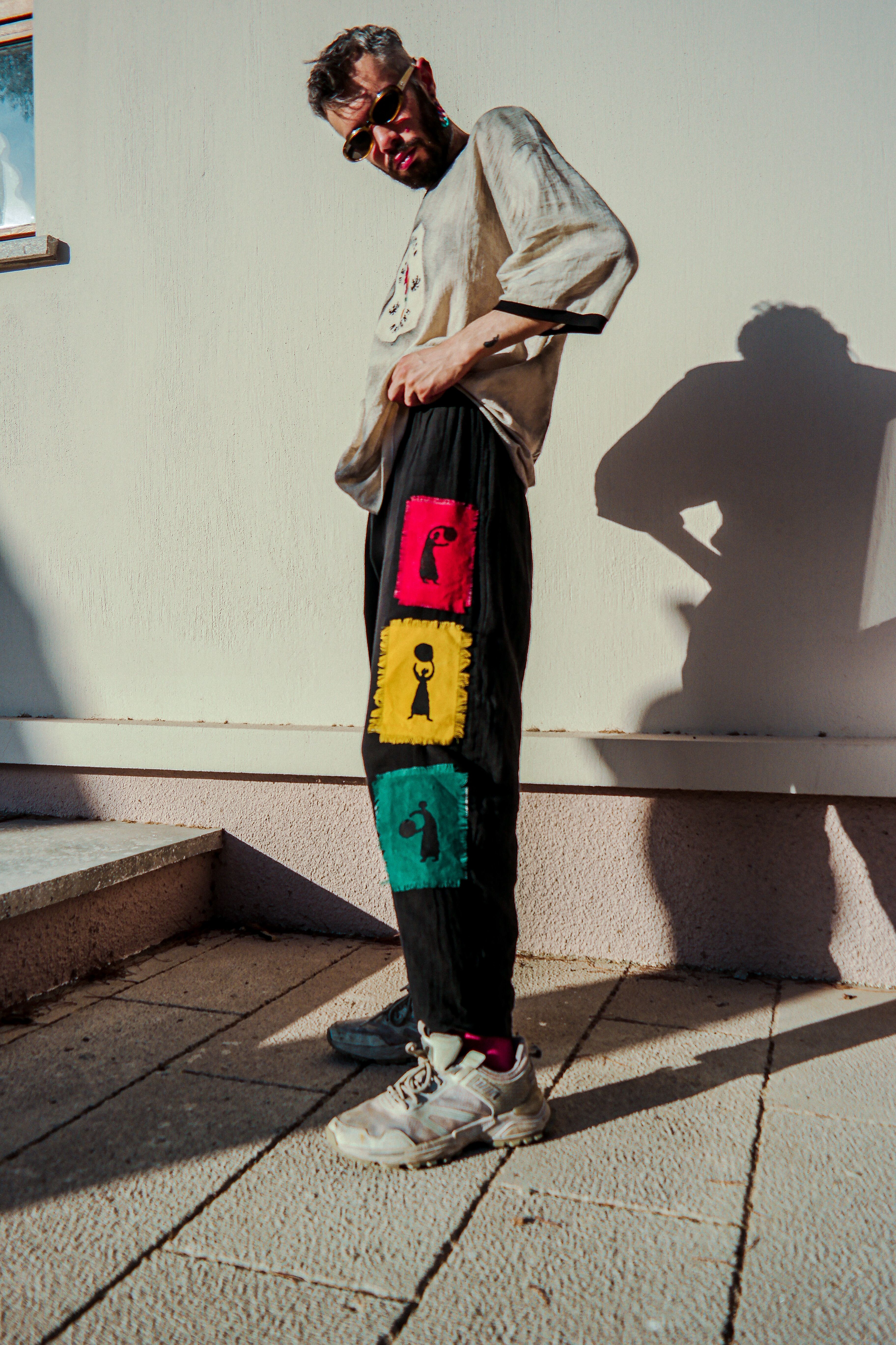 Man Posing in Pants with Patches · Free Stock Photo
