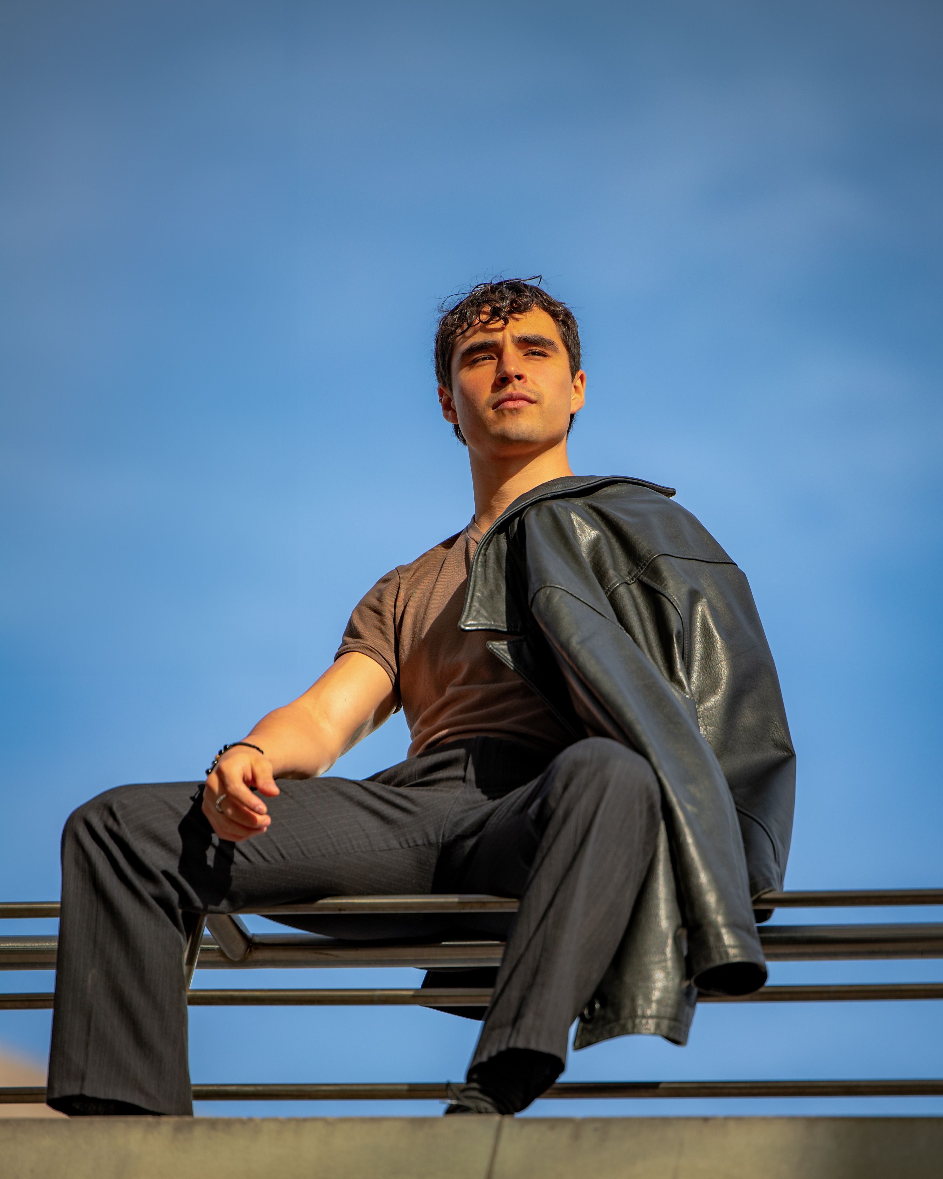 Man Sitting with Leather Jacket · Free Stock Photo
